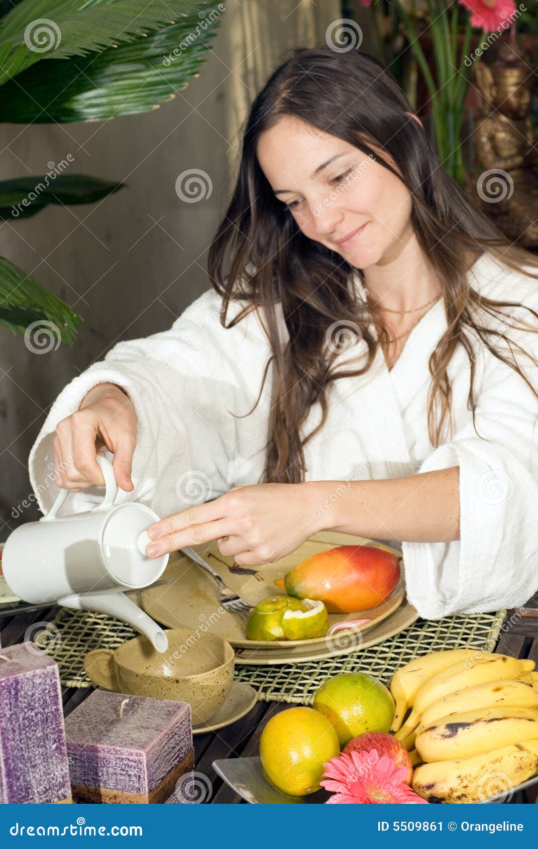 Woman Pouring Tea at Breakfast - Vertical Stock Image - Image of smile ...