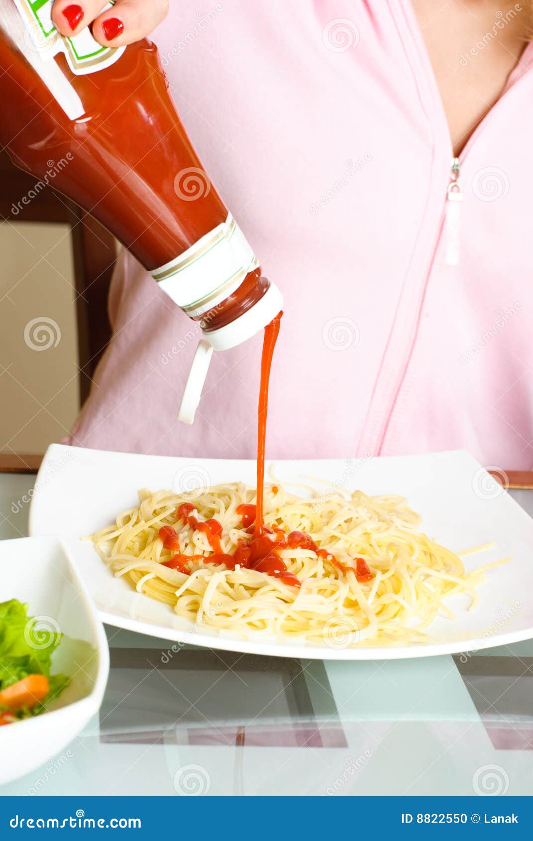 Woman Pouring Tomato Ketchup Stock Photo - Image of lunch, nutrition ...