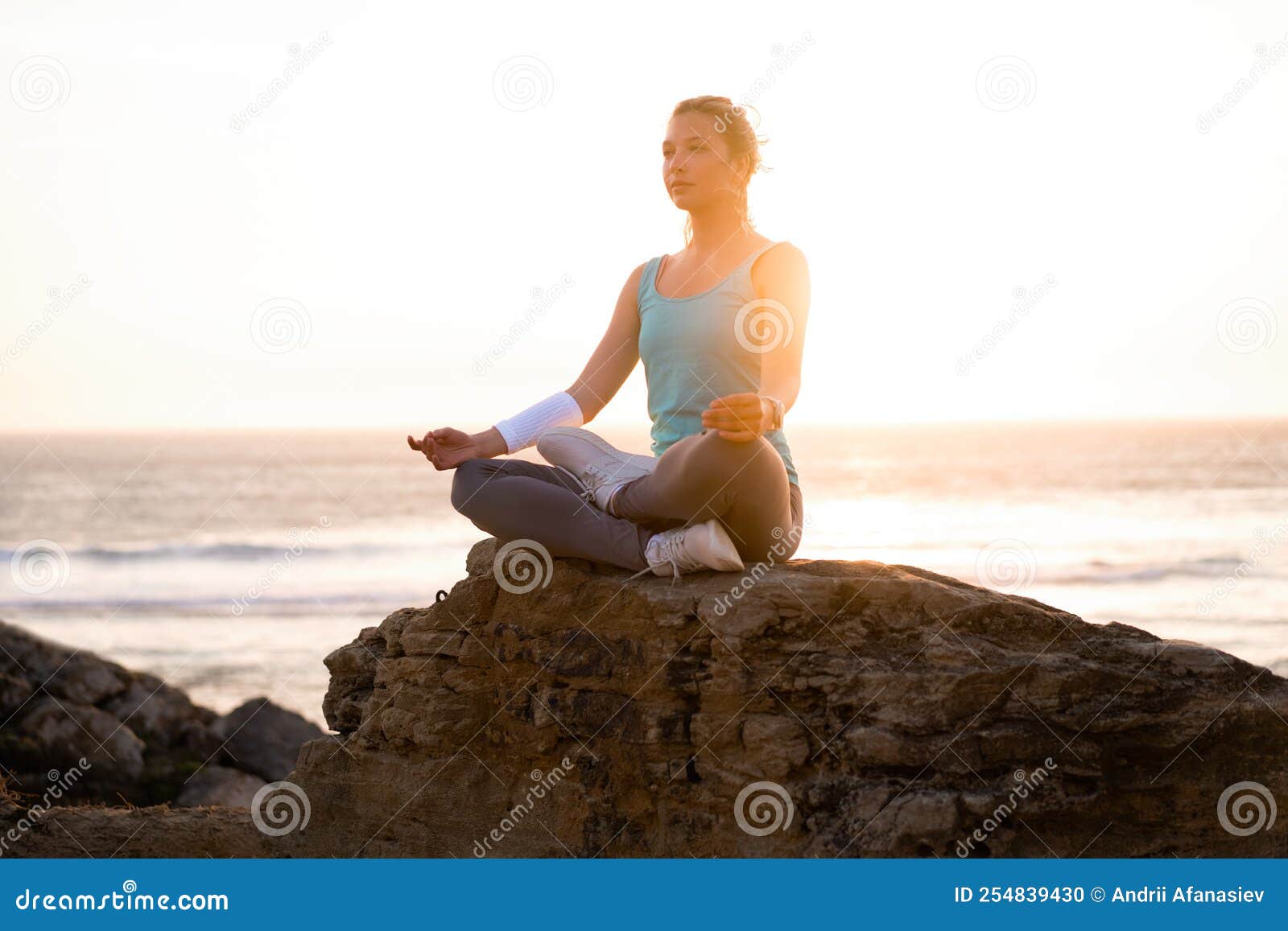Woman Practice Yoga Lotus Pose To Meditation With Summer Vacation Rocky