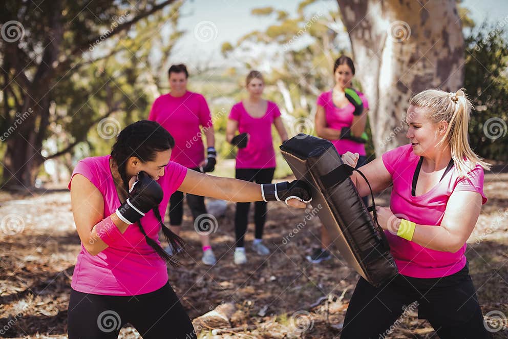 Woman Practicing Boxing in the Boot Camp Stock Image - Image of boxer ...