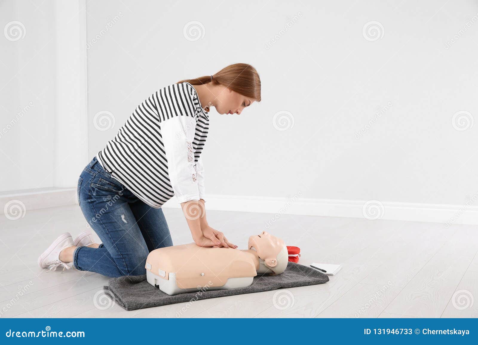 Woman Practicing First Aid on Mannequin Stock Image - Image of medical ...