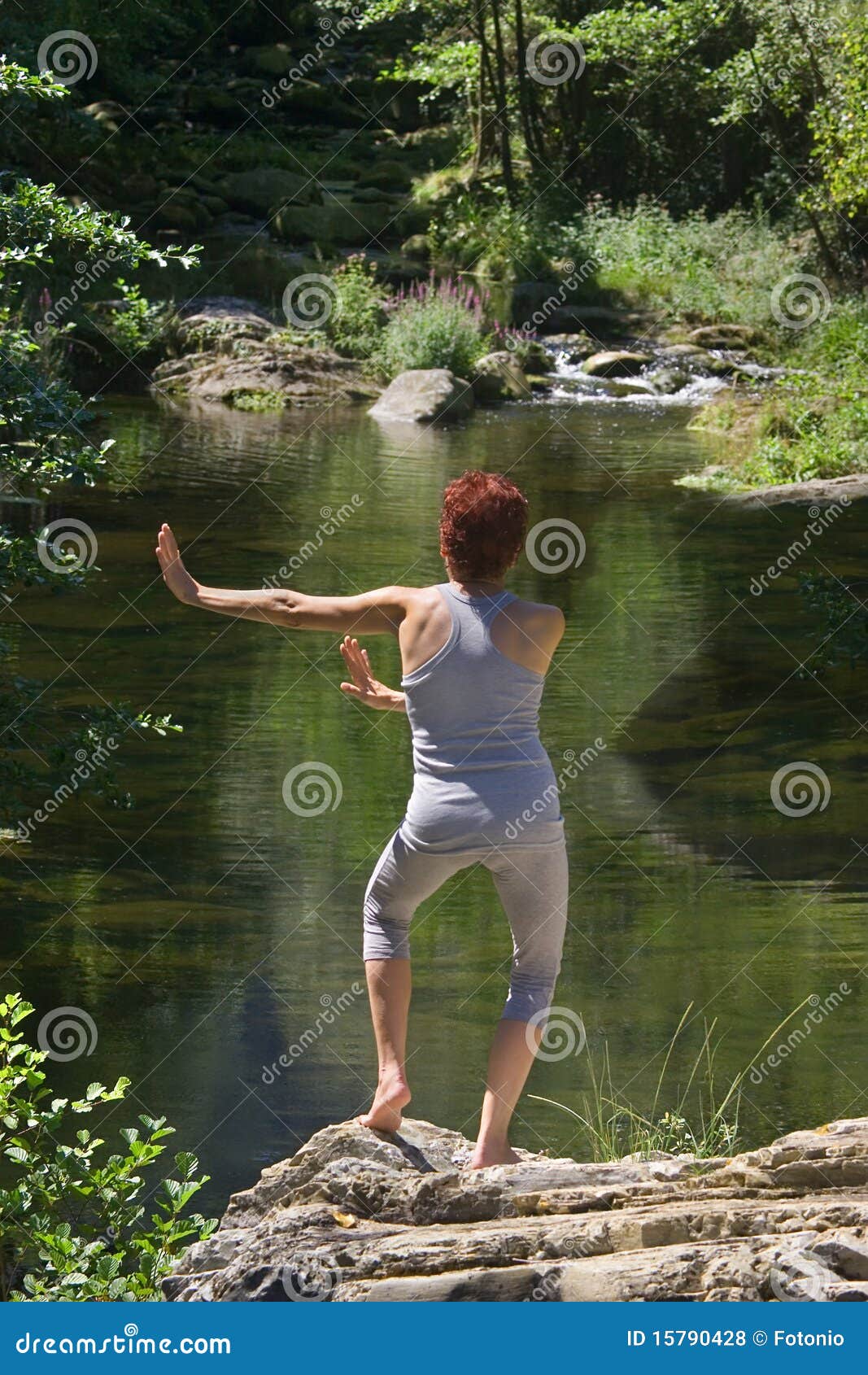 Woman Practicing Tai-Chi in Front of a River. Stock Photo - Image of ...