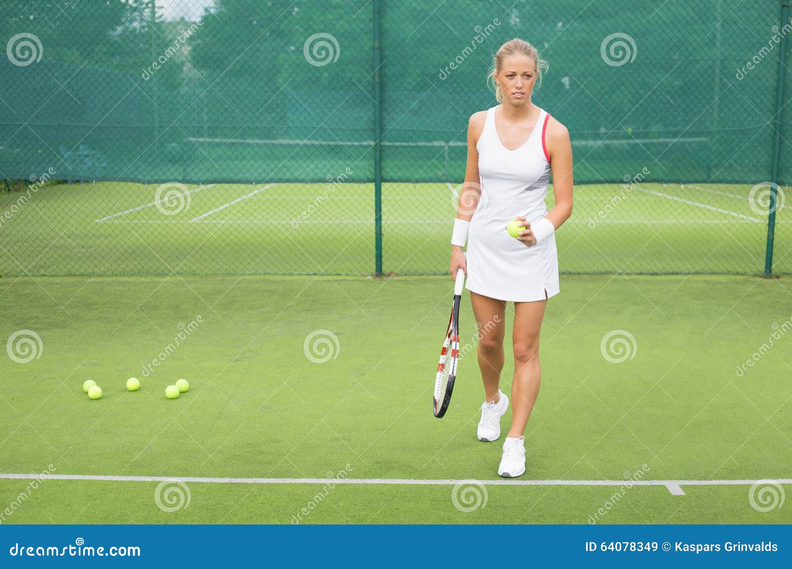 Woman practicing tennis stock image. Image of clothing - 64078349