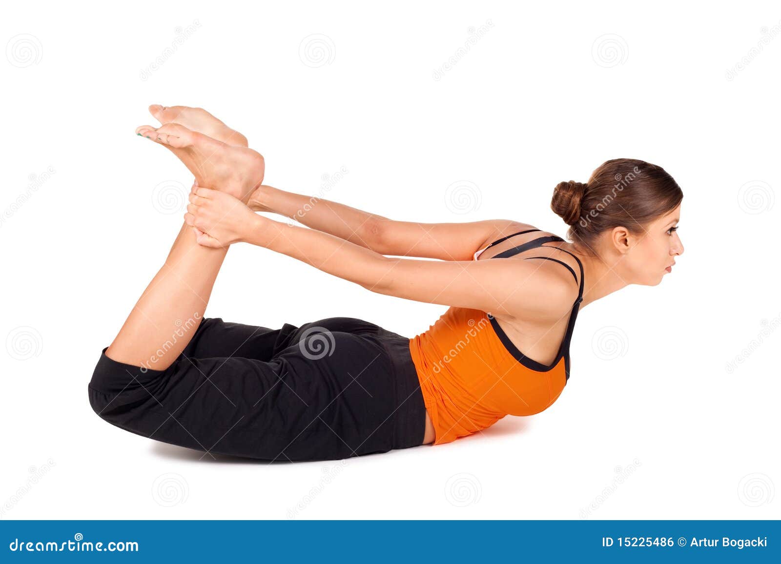 Woman Practicing Yoga Exercise Called Bow Pose Stock Photo - Image of ...