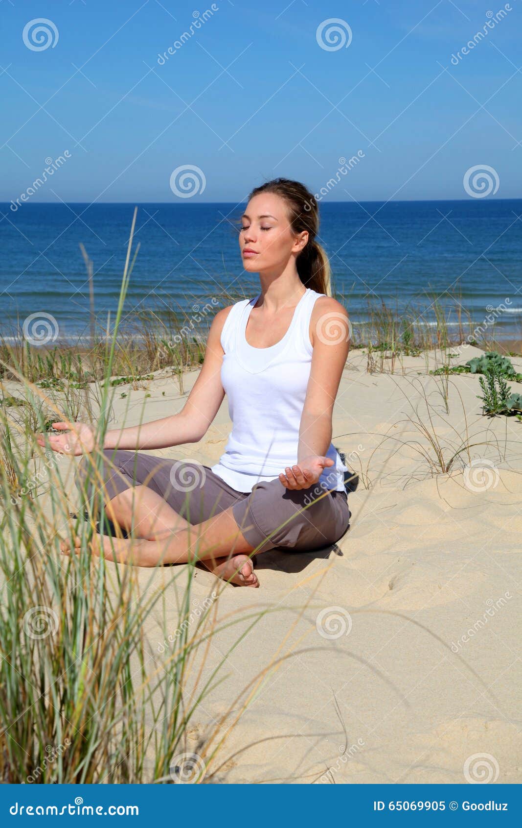 Woman Practicing Youga on a Sandy Beach Stock Image - Image of ...