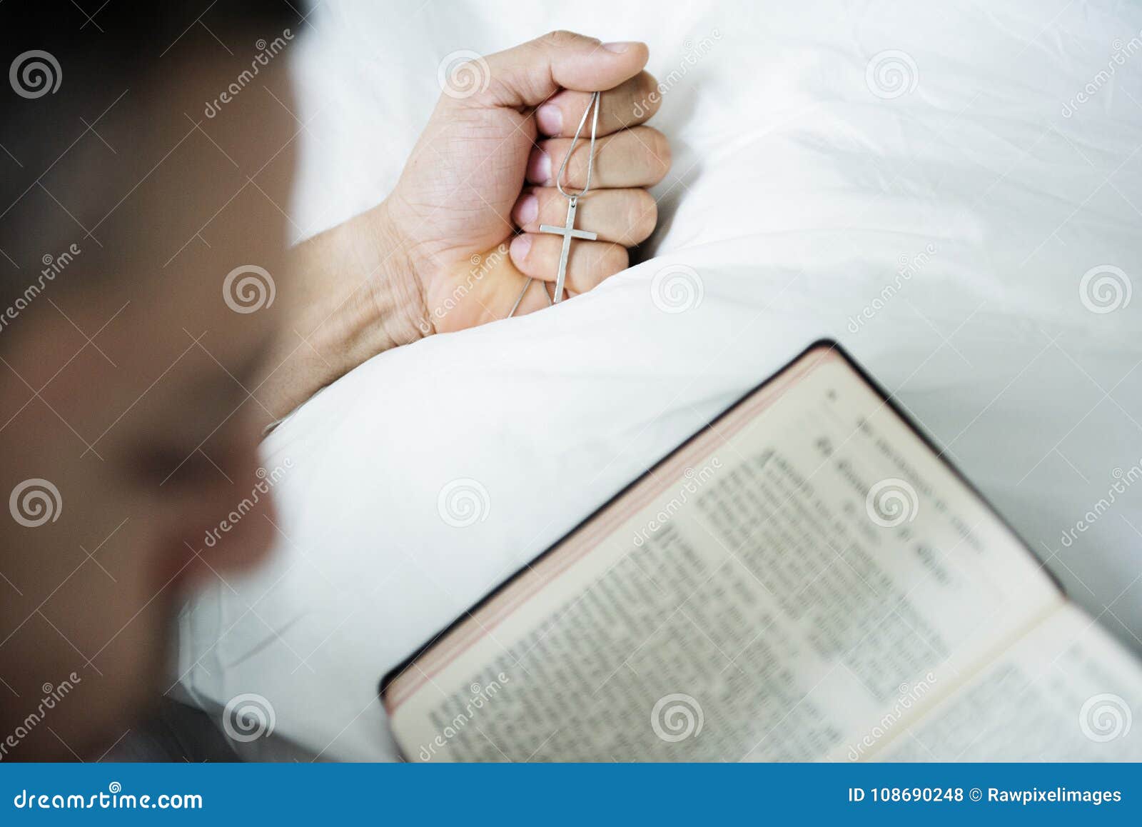 A Woman Praying while Holding Cross Stock Photo - Image of pajamas ... A Woman Praying while Holding Cross Stock Photo - Image of pajamas ...