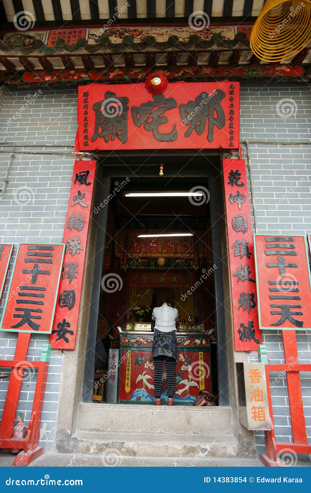Woman Praying at Na-tcha Temple Editorial Stock Image - Image of walls ...