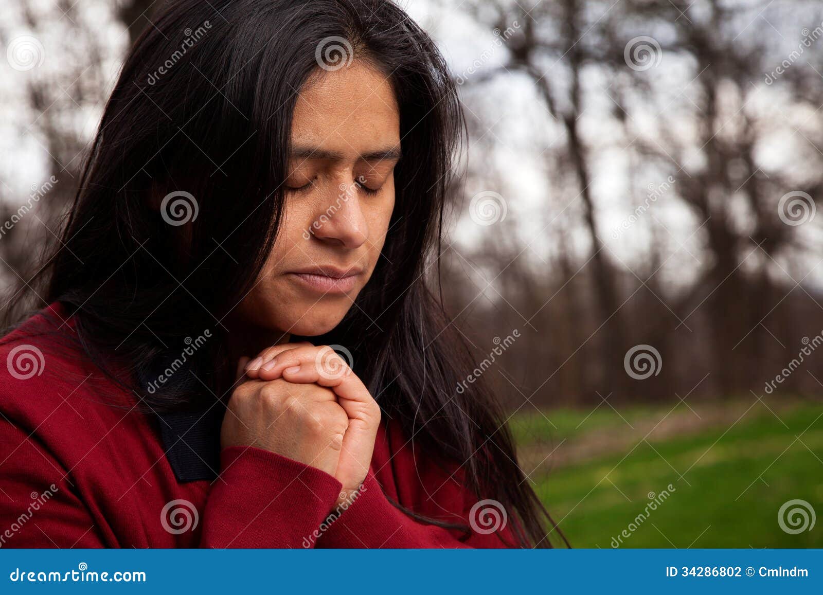 Woman Praying Outdoors stock photo. Image of woman, trees - 34286802
