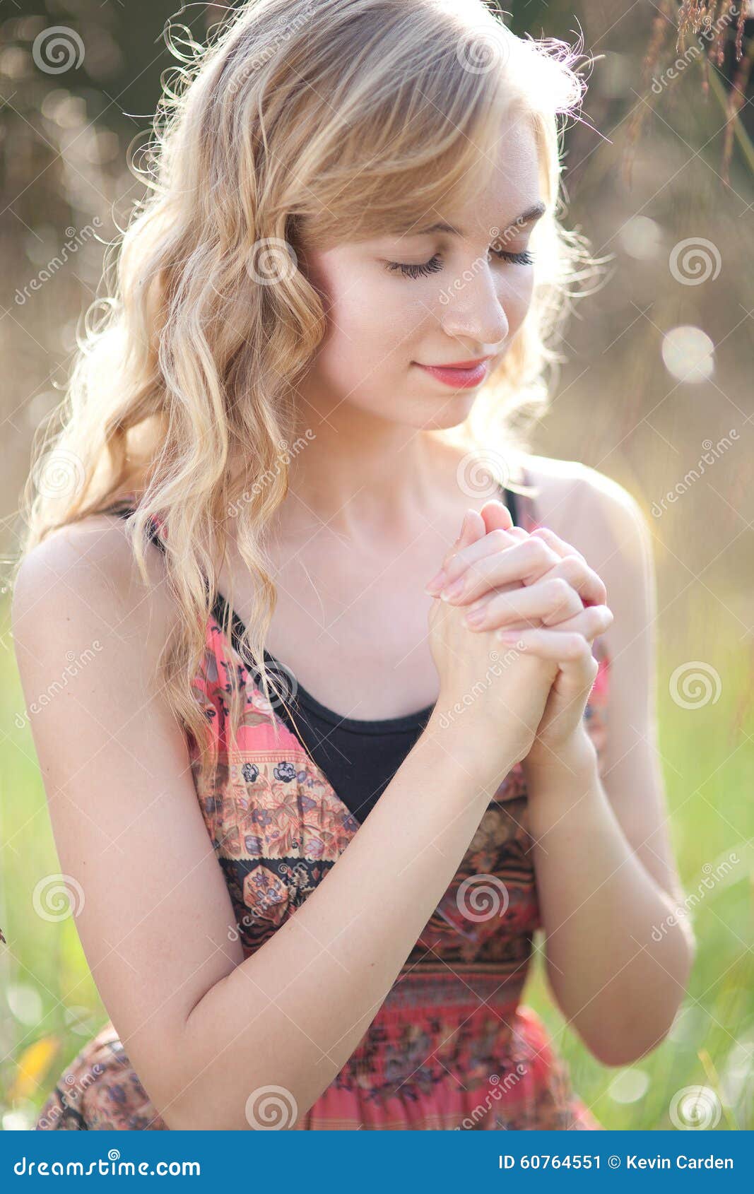 Woman praying outside stock image. Image of worship, praise - 60764551