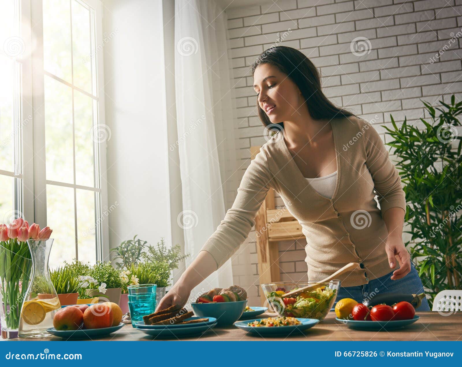 Woman prepares the dinner stock photo. Image of event - 66725826