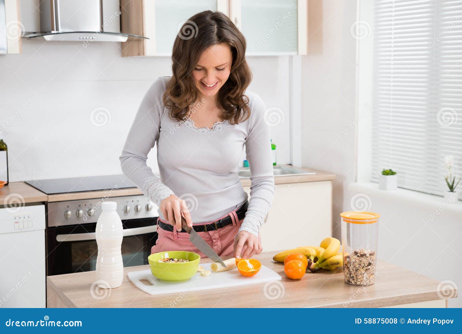Woman Preparing Breakfast stock photo. Image of housework - 58875008