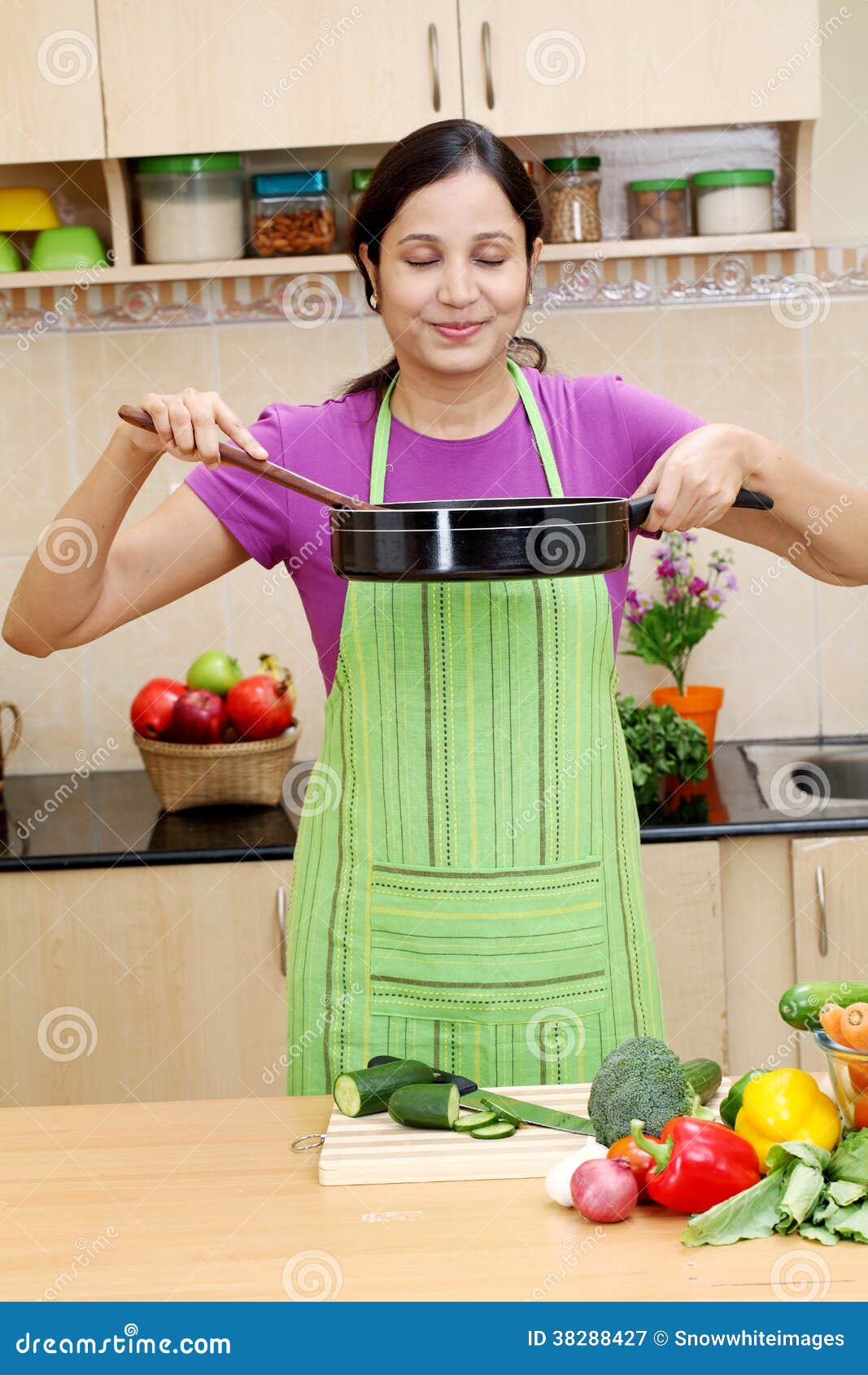 Woman Preparing a Dish in Her Kitchen Stock Image - Image of beautiful ...