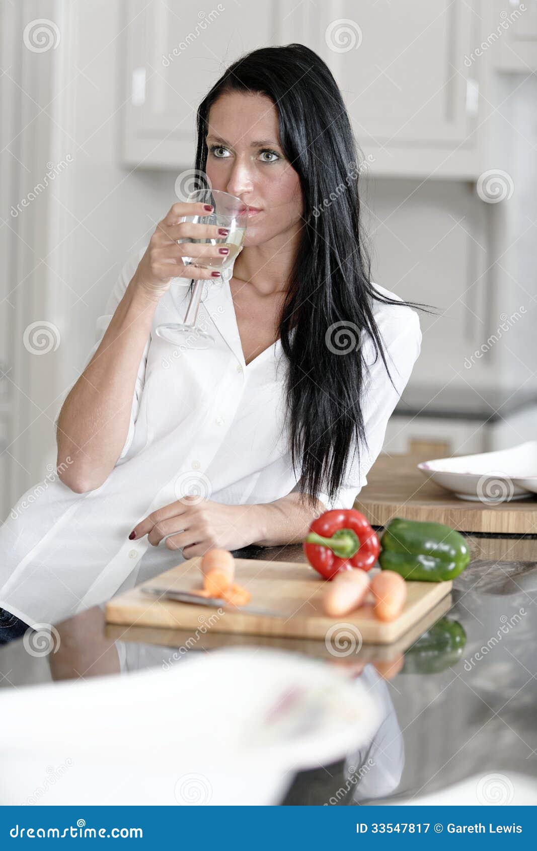 Woman Preparing A Meal In The Kitchen Stock Image Image Of Peppers