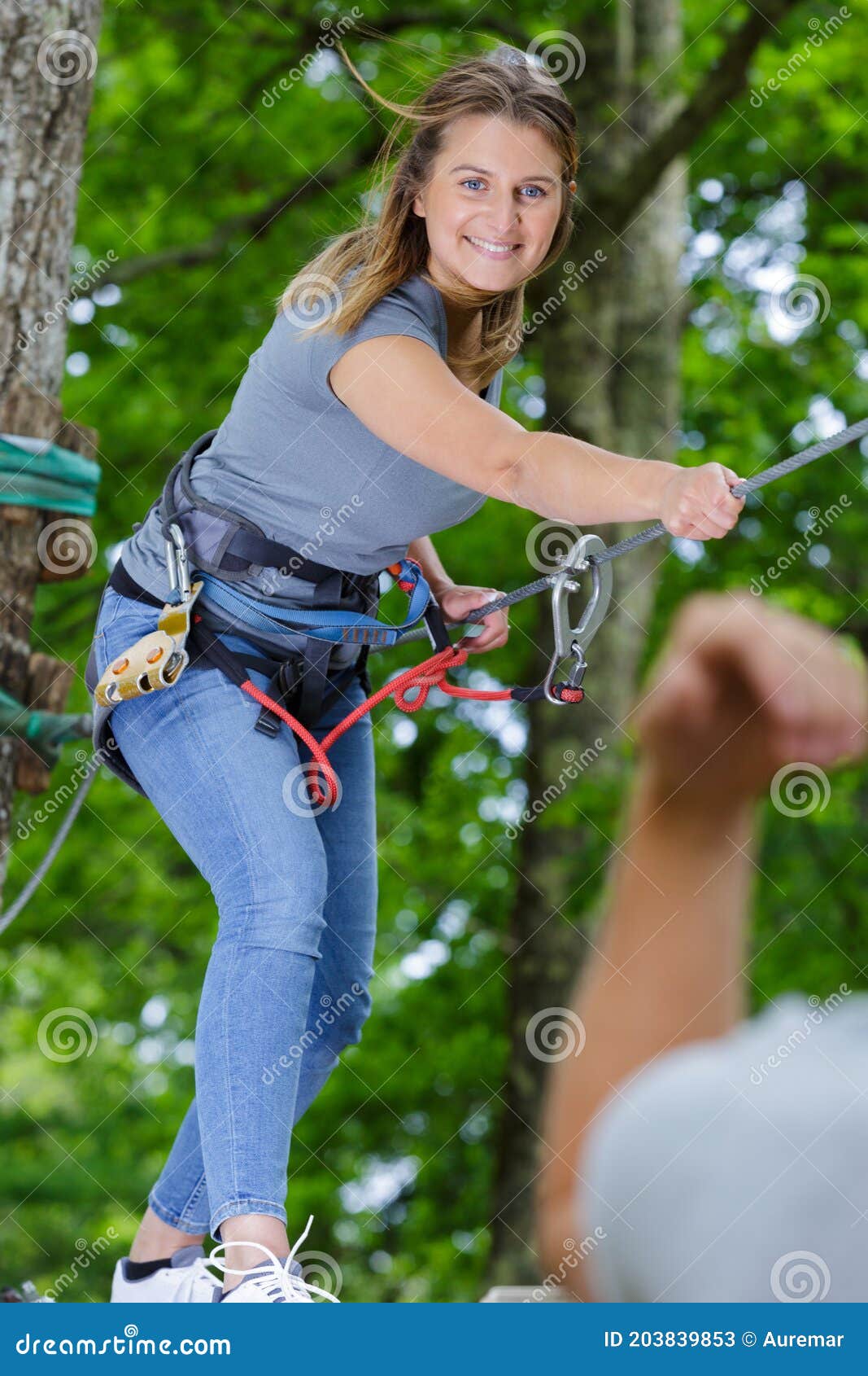 Woman preparing to zipline stock image. Image of leisure - 203839853