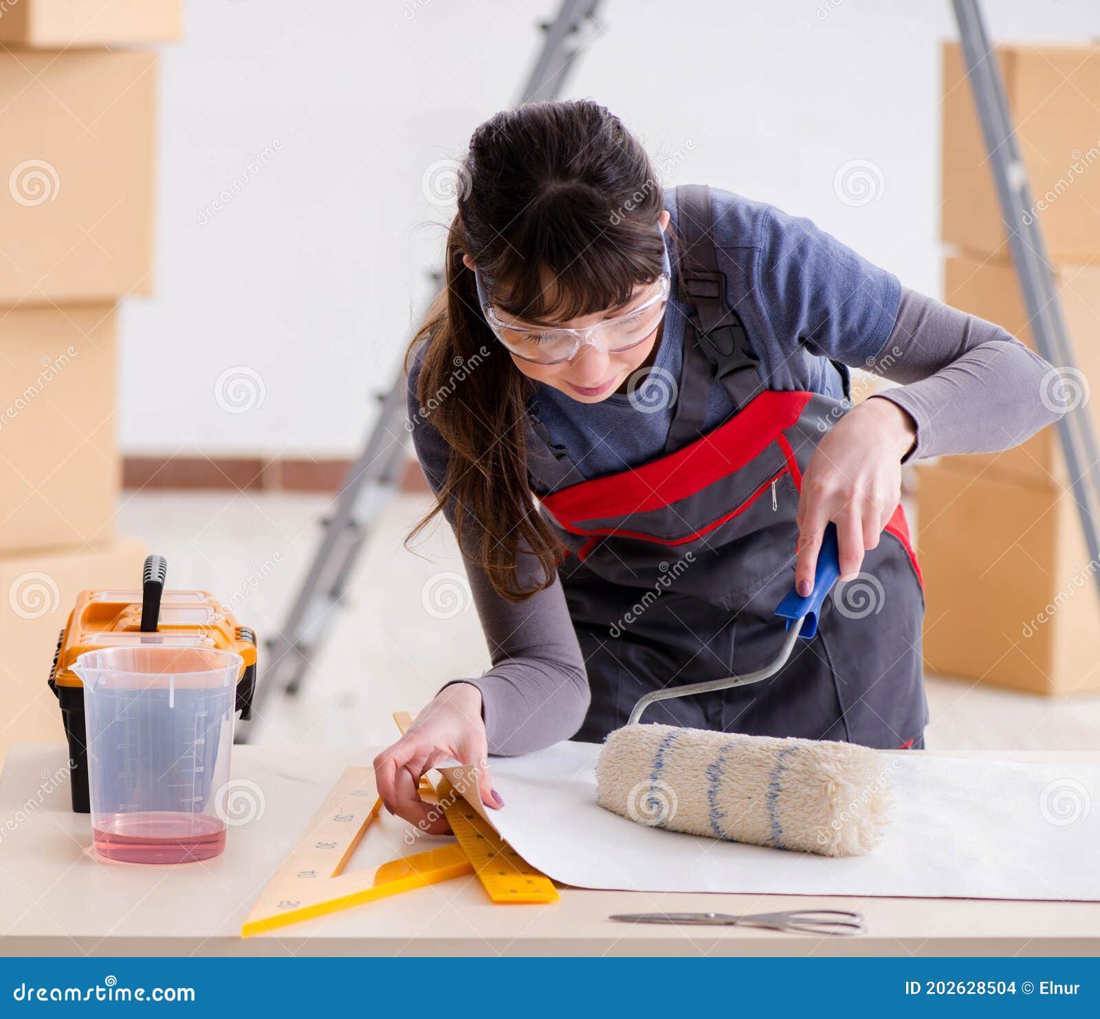 Woman Preparing for Wallpaper Work Stock Photo - Image of indoor, home ...