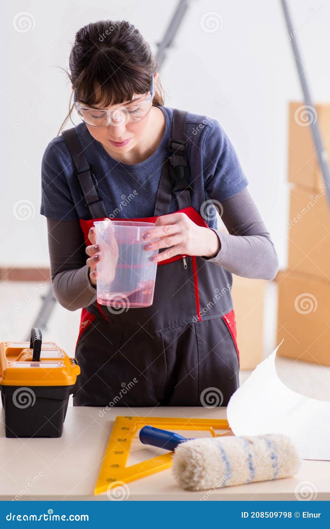 Woman Preparing for Wallpaper Work Stock Photo - Image of interior ...