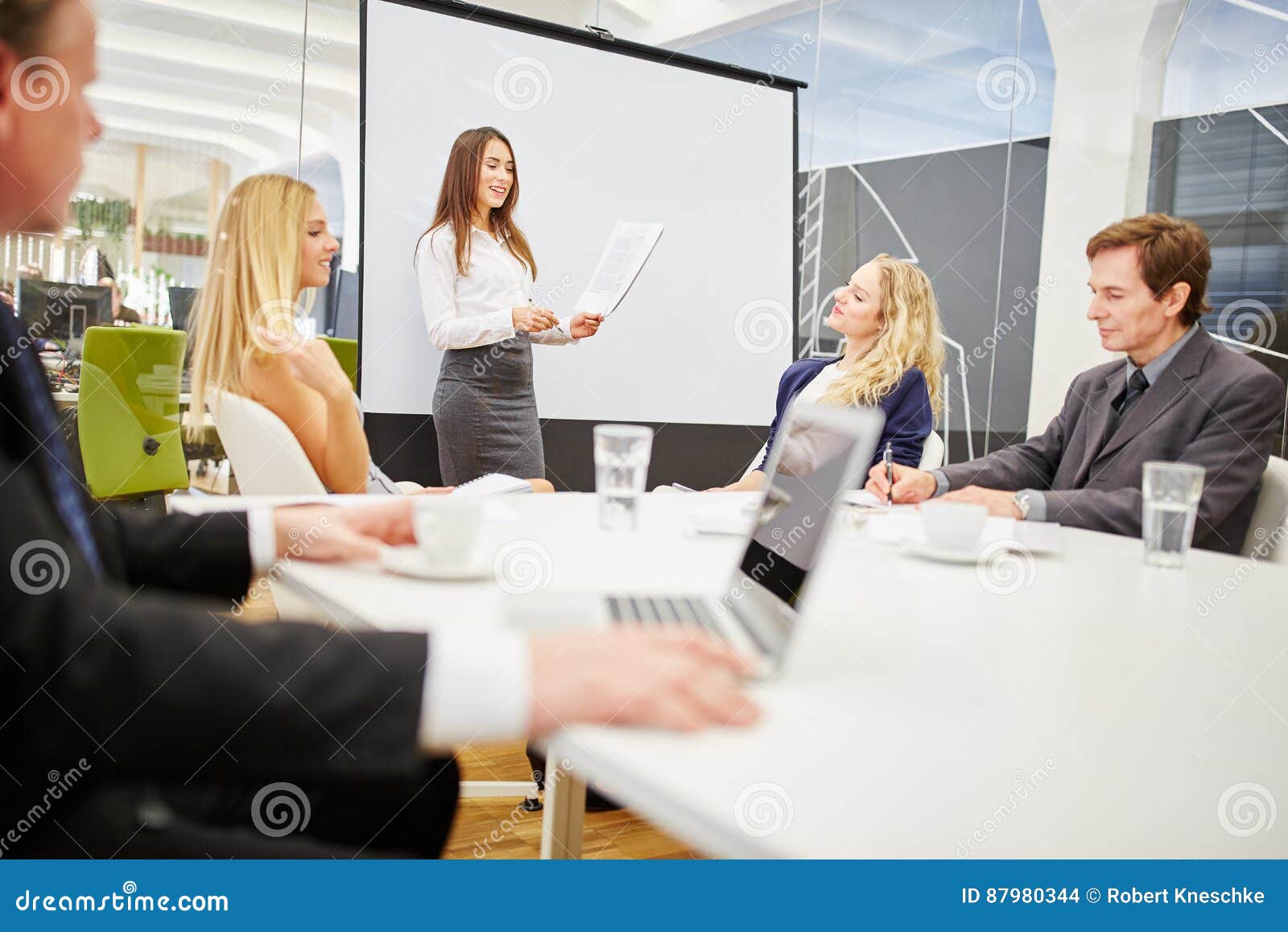Woman in a presentation stock photo. Image of lecture - 87980344