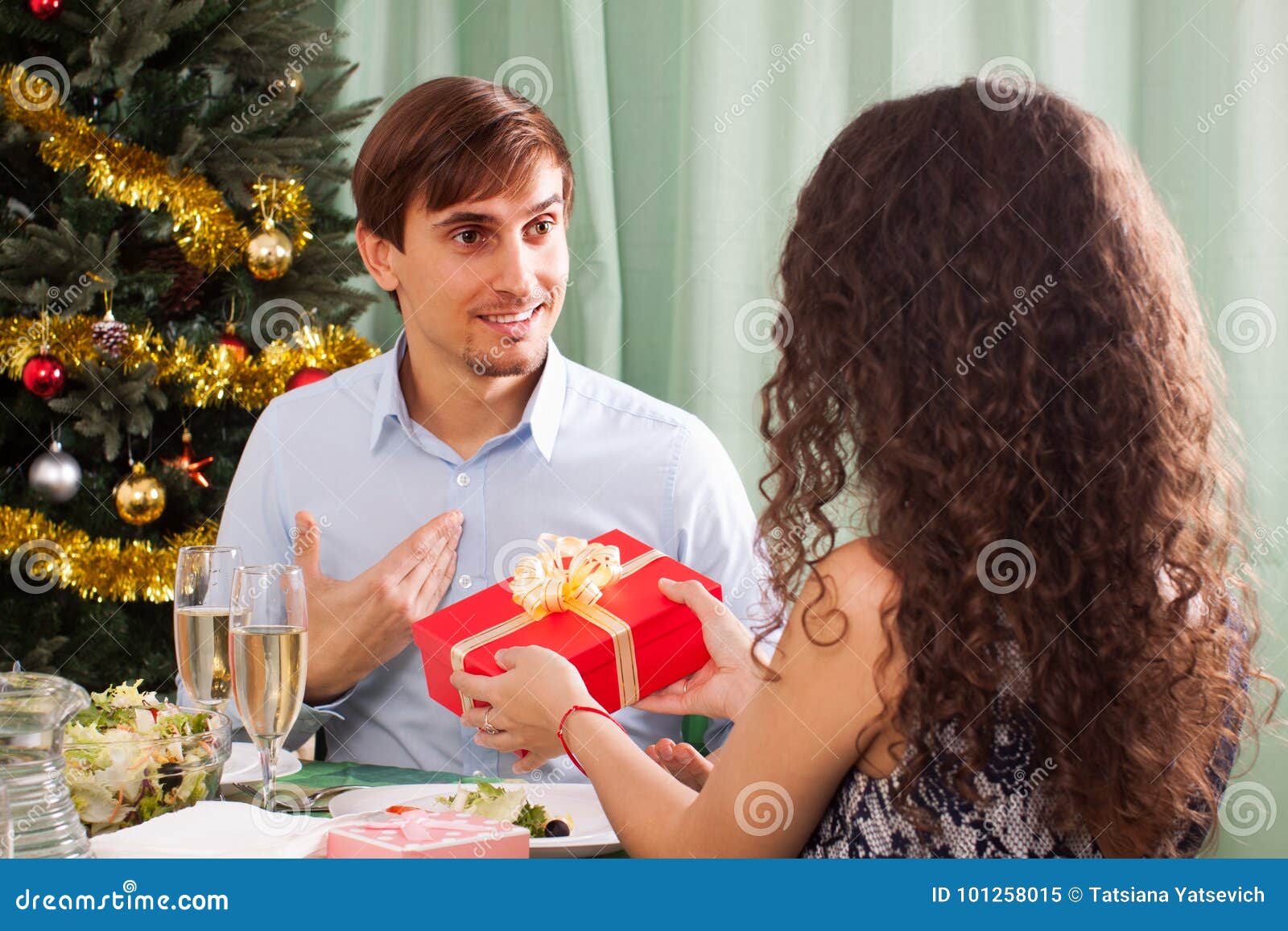Woman Presenting Gift To Man Stock Image - Image of dinner, domestic ...