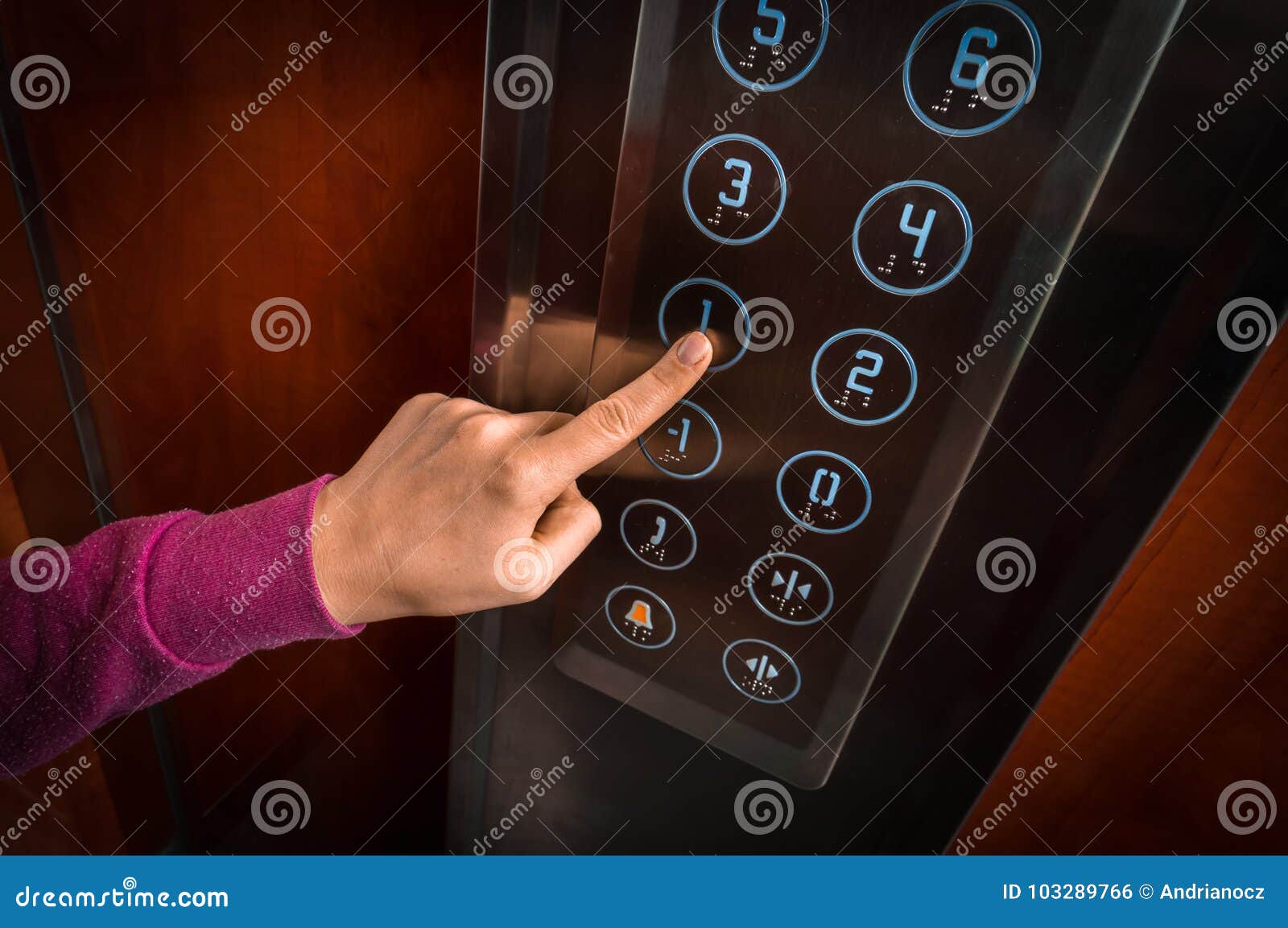 Woman Pressing the Button in the Elevator Interior Stock Photo - Image ...