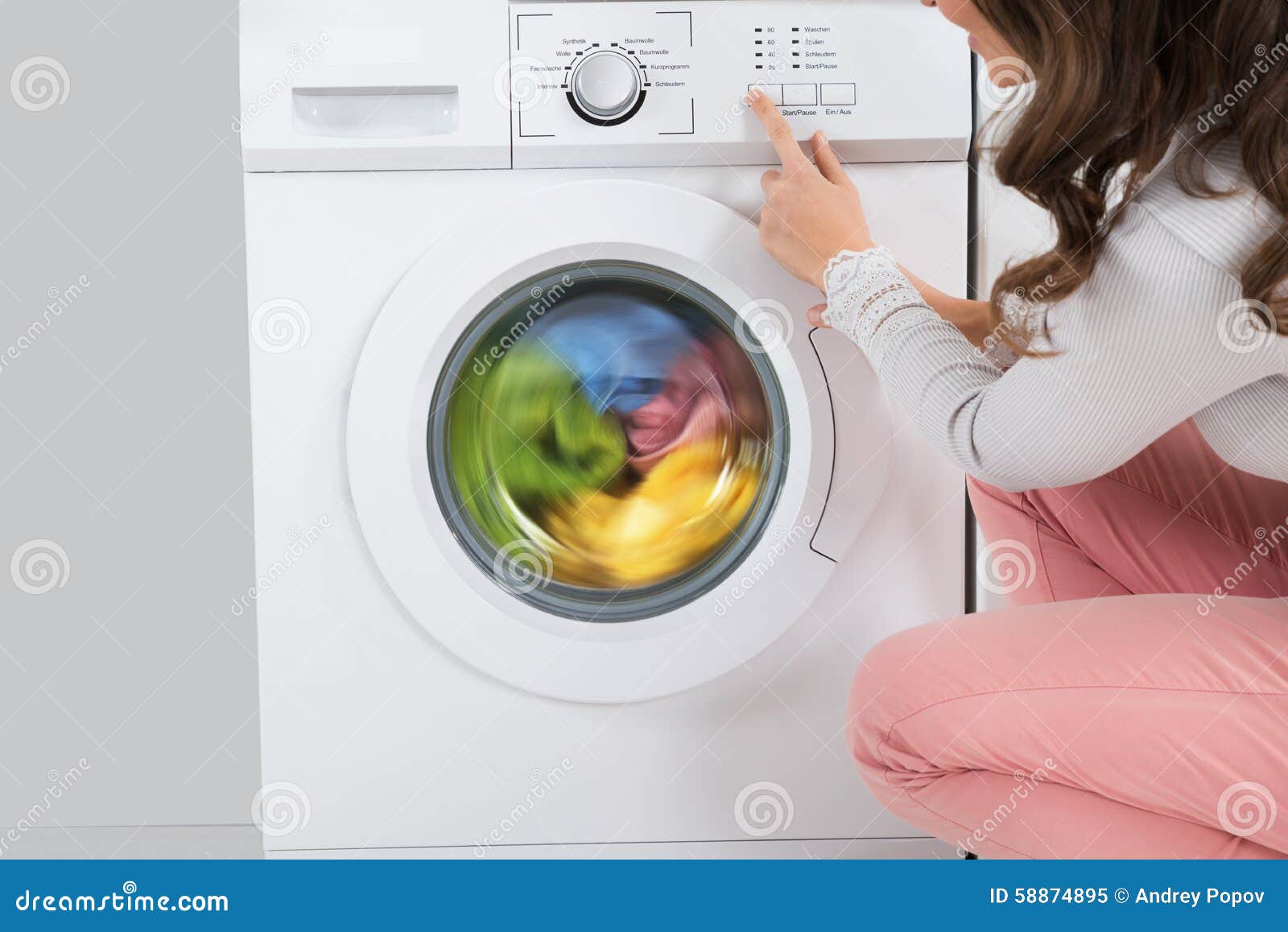 Woman Pressing Button of Washing Machine Stock Image - Image of closeup ...