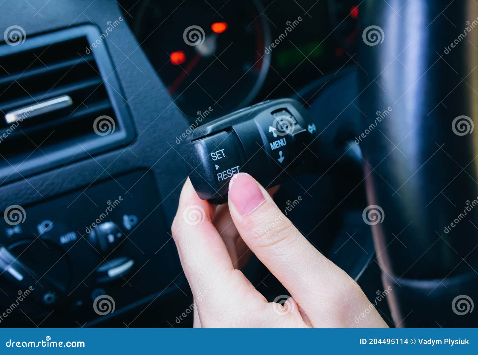 Woman is Pressing Buttons in the Car while Driving Stock Photo - Image ...
