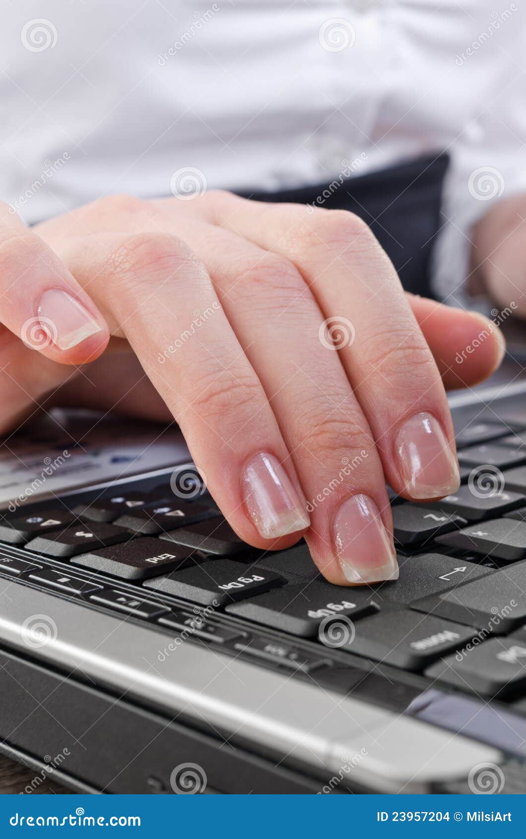 Woman pressing enter key stock photo. Image of close - 23957204