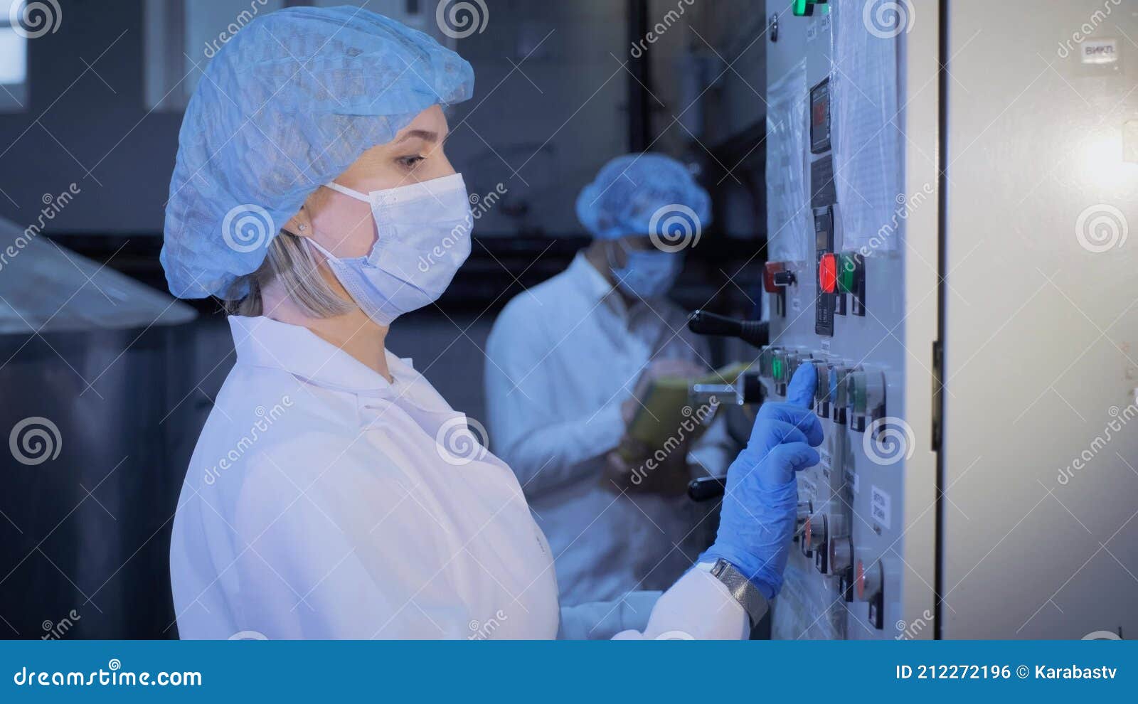 A Woman in Production Controls the Process Stock Footage - Video of ...