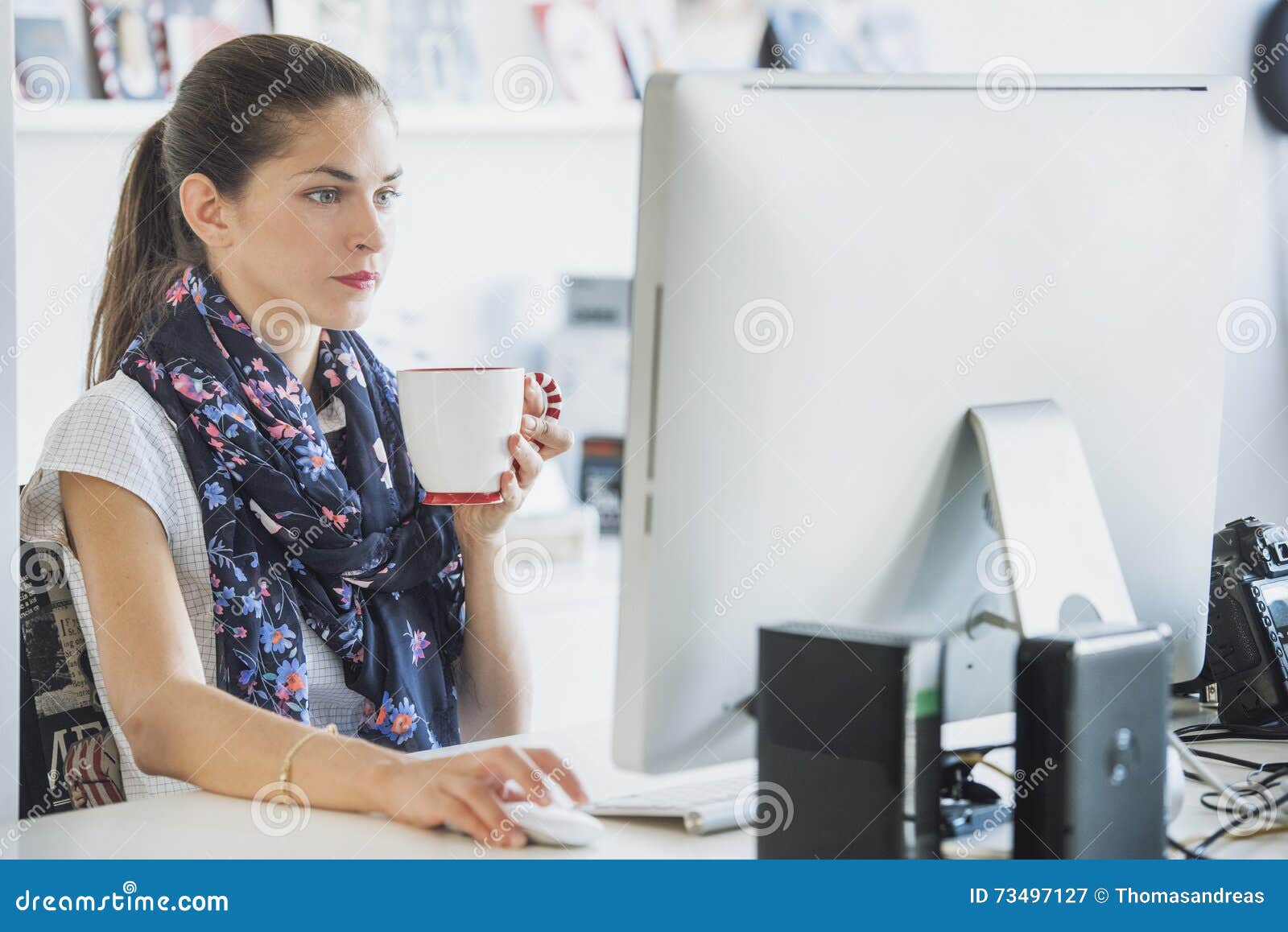 Woman Professional is Using a Computer Drinking a Beverage Stock Image ...