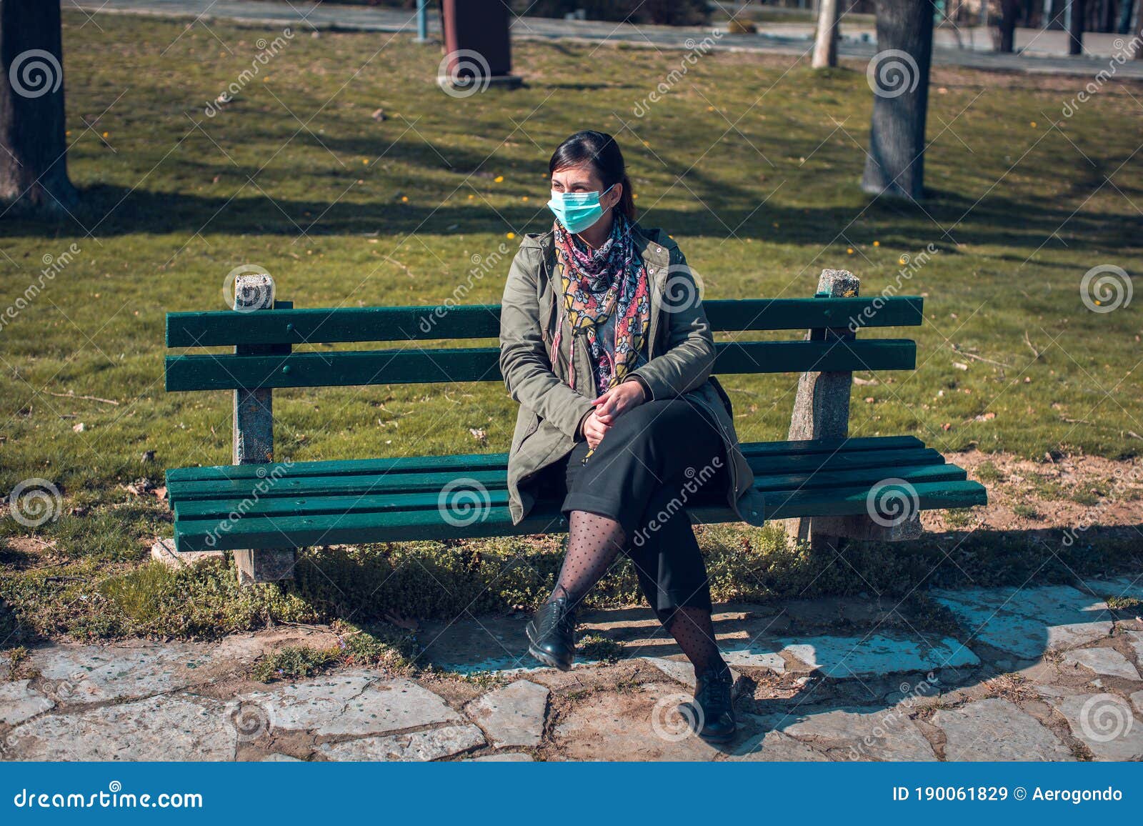 Woman With Protective Face Social Distancing On Empty Park Bench ...
