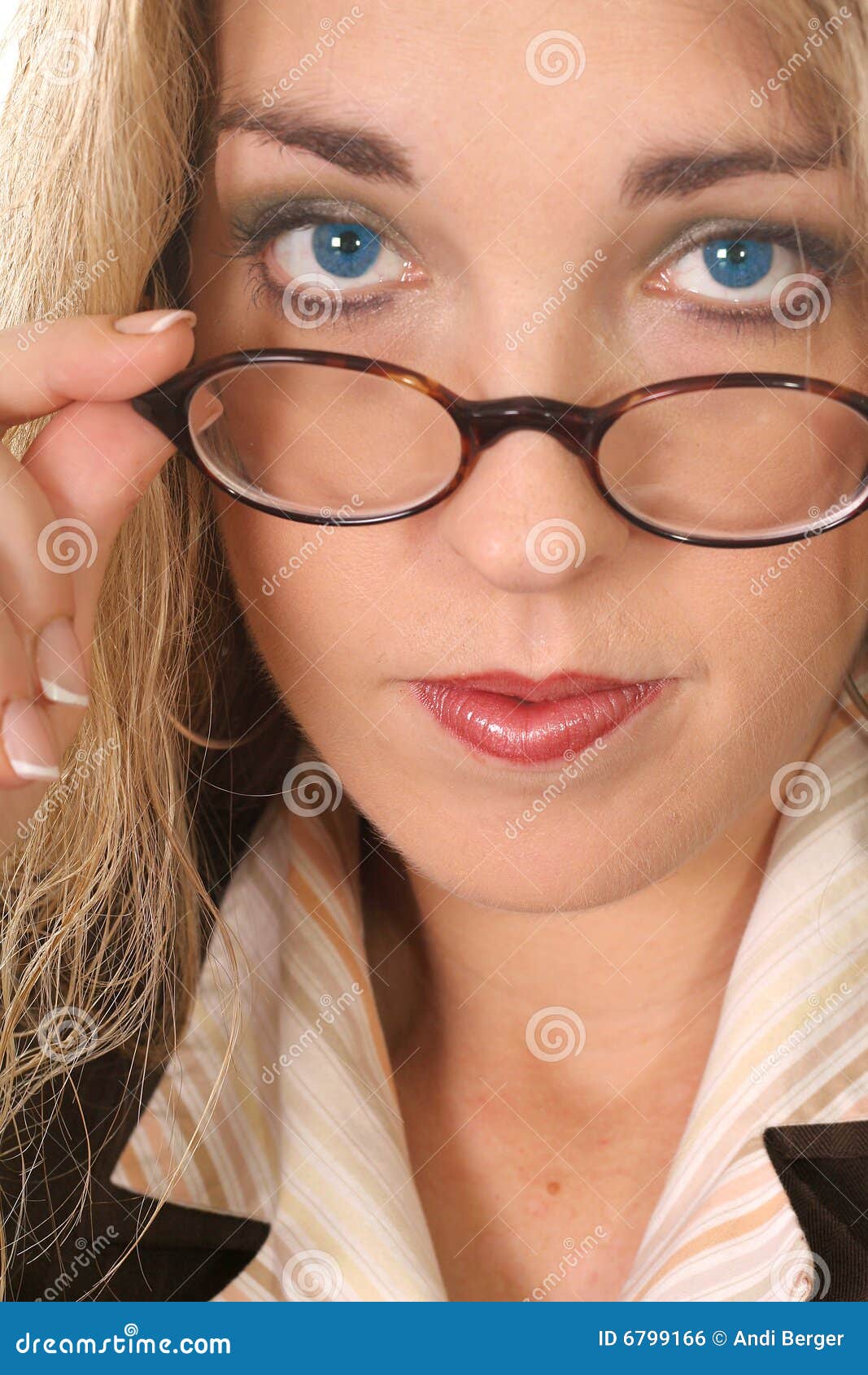 Woman Pulling Her Glasses Down - Blue Eyes Picture. Image: 6799166
