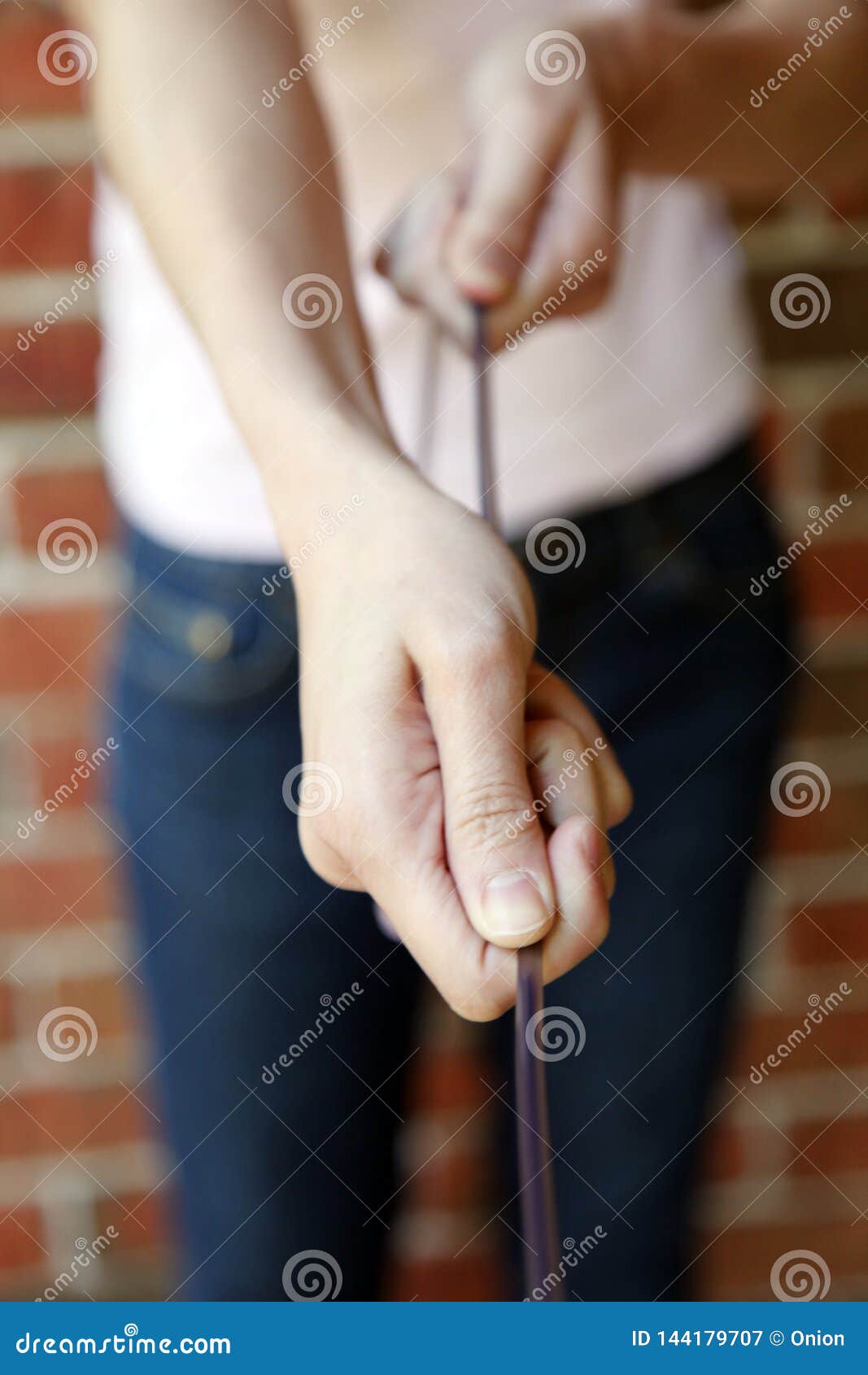 Woman Pulling Rope with Both Hands Stock Image - Image of stretch, wall ...