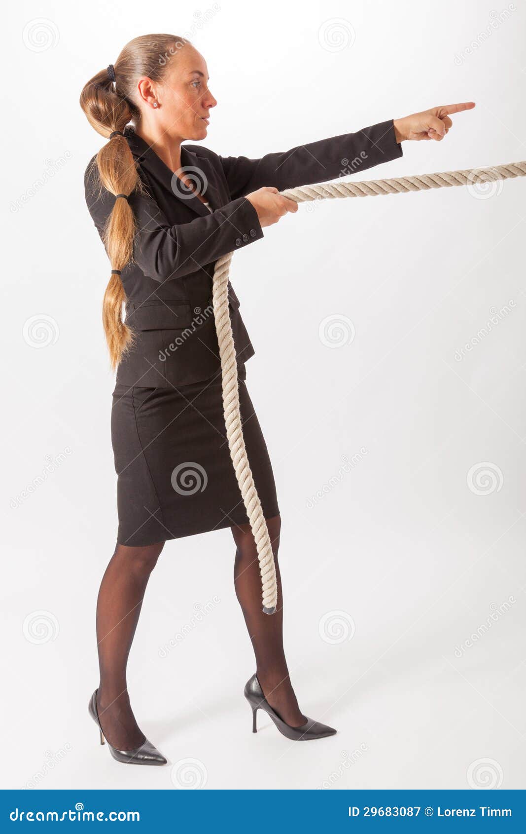 A Woman is Pulling at a Thick Rope Stock Image - Image of female ...