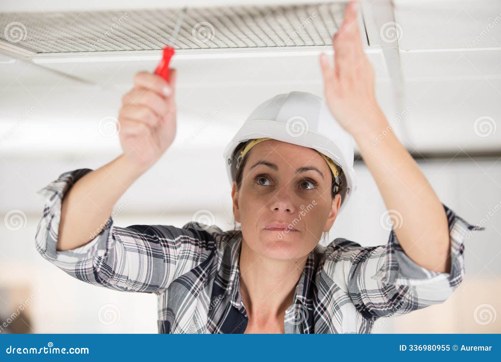 Woman Pulling To Ceiling in Repair Stock Image - Image of arranging ...