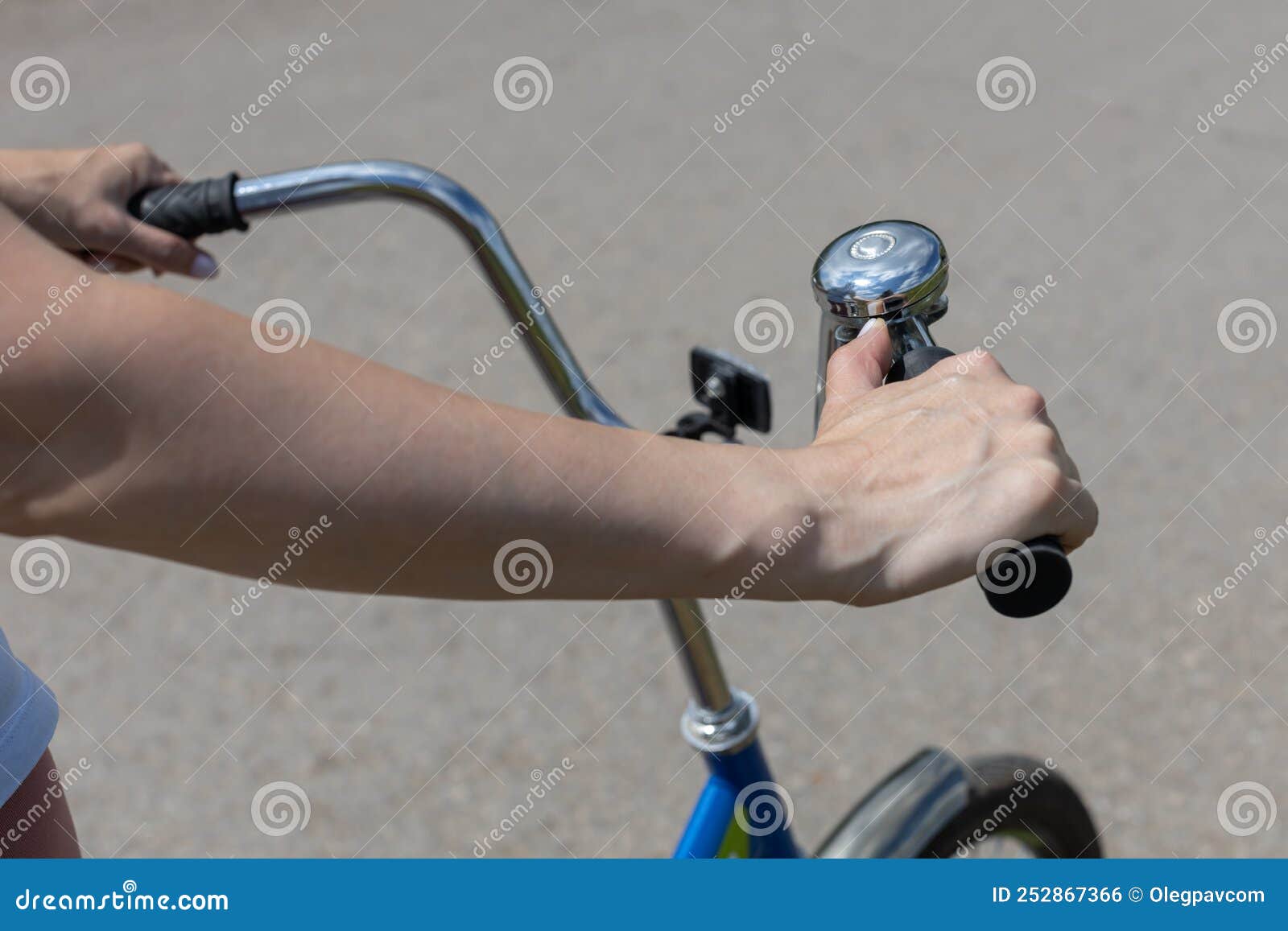 Woman Pulling the Trigger of a Bicycle Bell Stock Photo - Image of ...