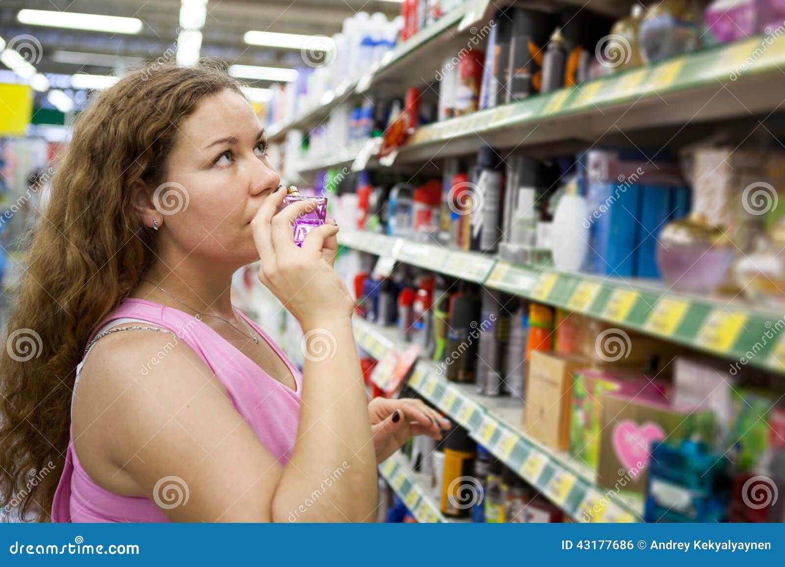 Woman Purchaser Smelling Perfume in Shop Stock Photo - Image of ...