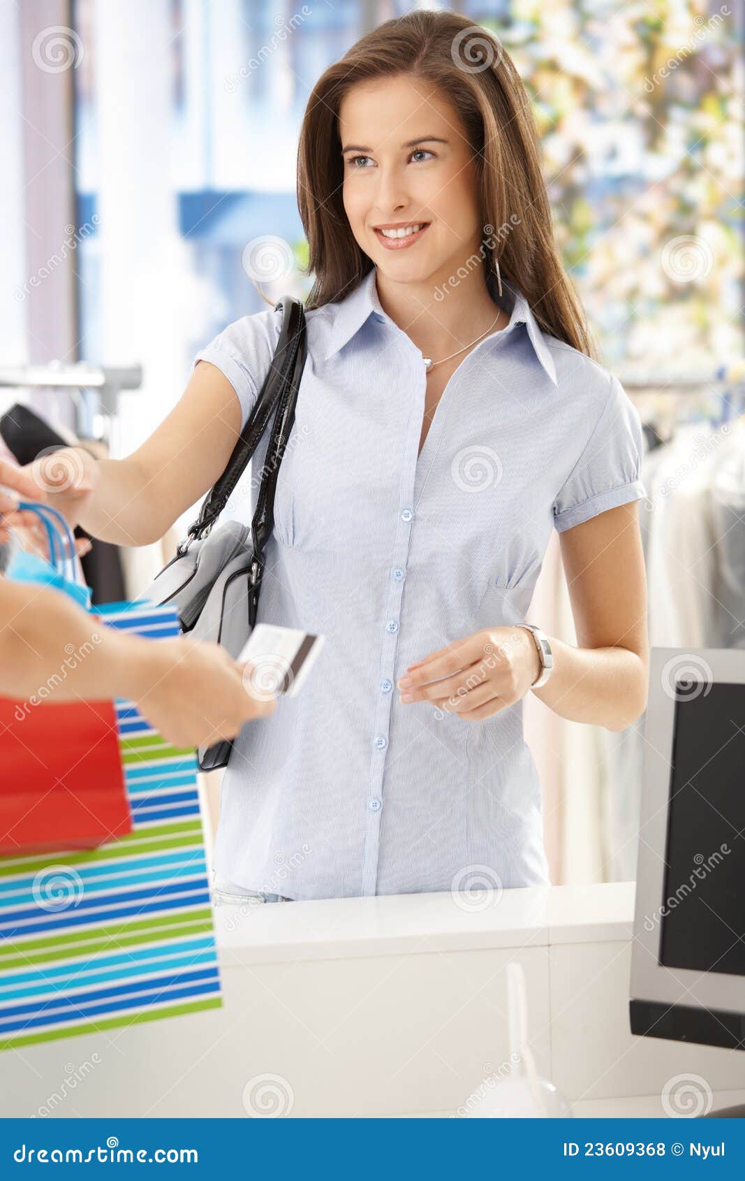 Woman Purchasing Clothes in Shop Stock Photo - Image of beauty ...