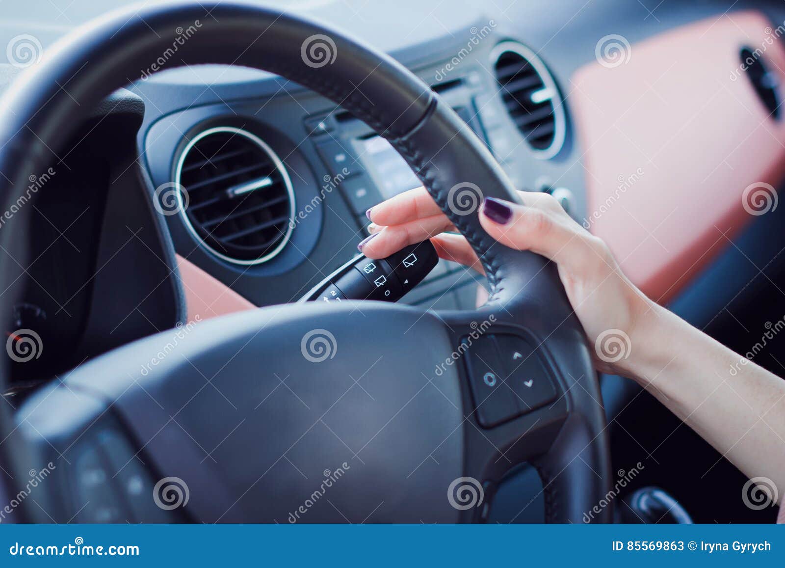 Woman Push the Button on a Steering Wheel in Car Stock Image - Image of ...