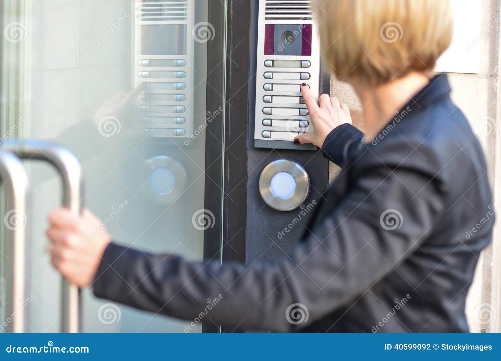 Woman Pushing a Intercom Button Stock Photo - Image of buttons, female ...