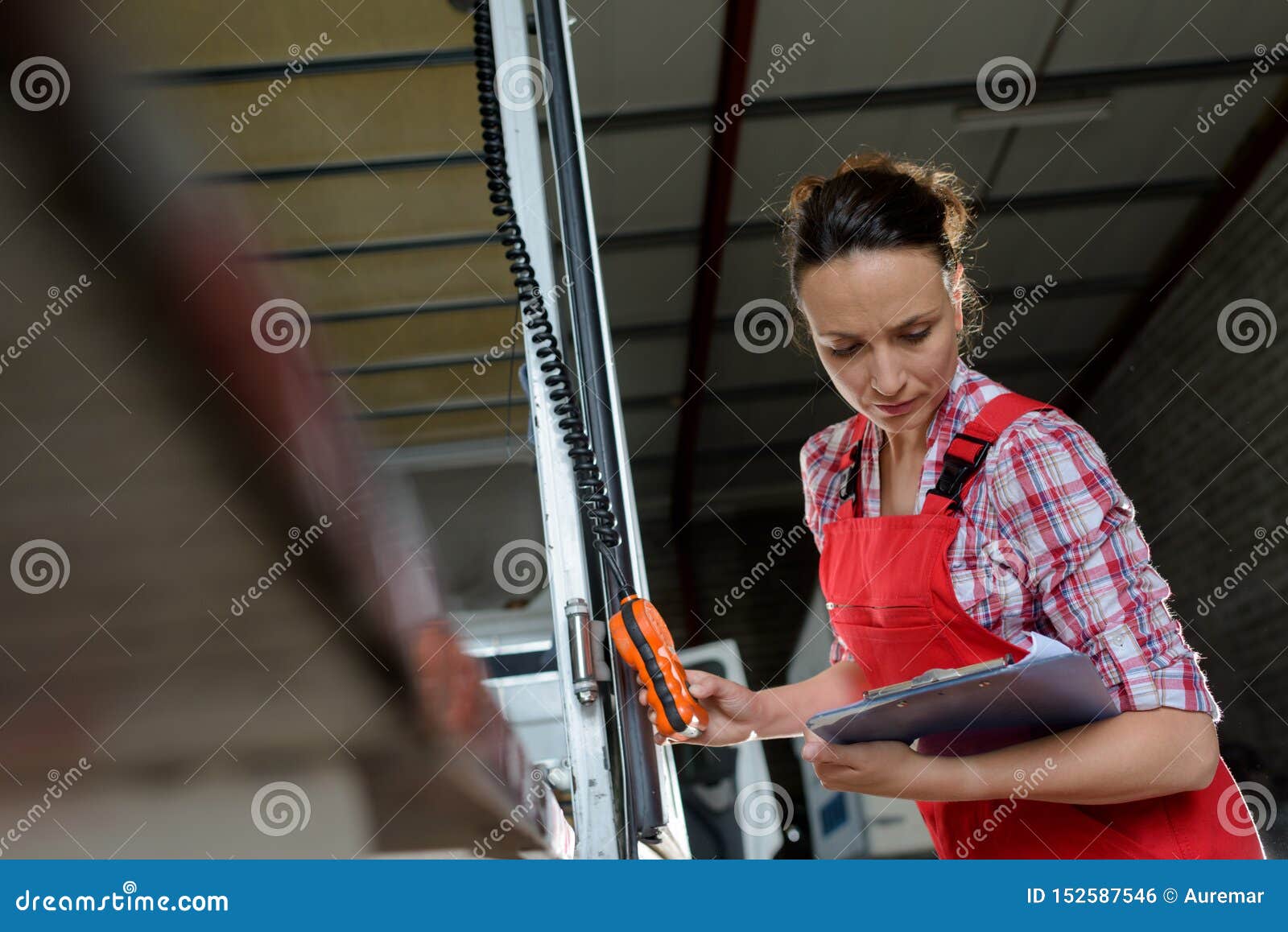 Woman Pushing Red Button in Factory Stock Photo - Image of click, hand ...