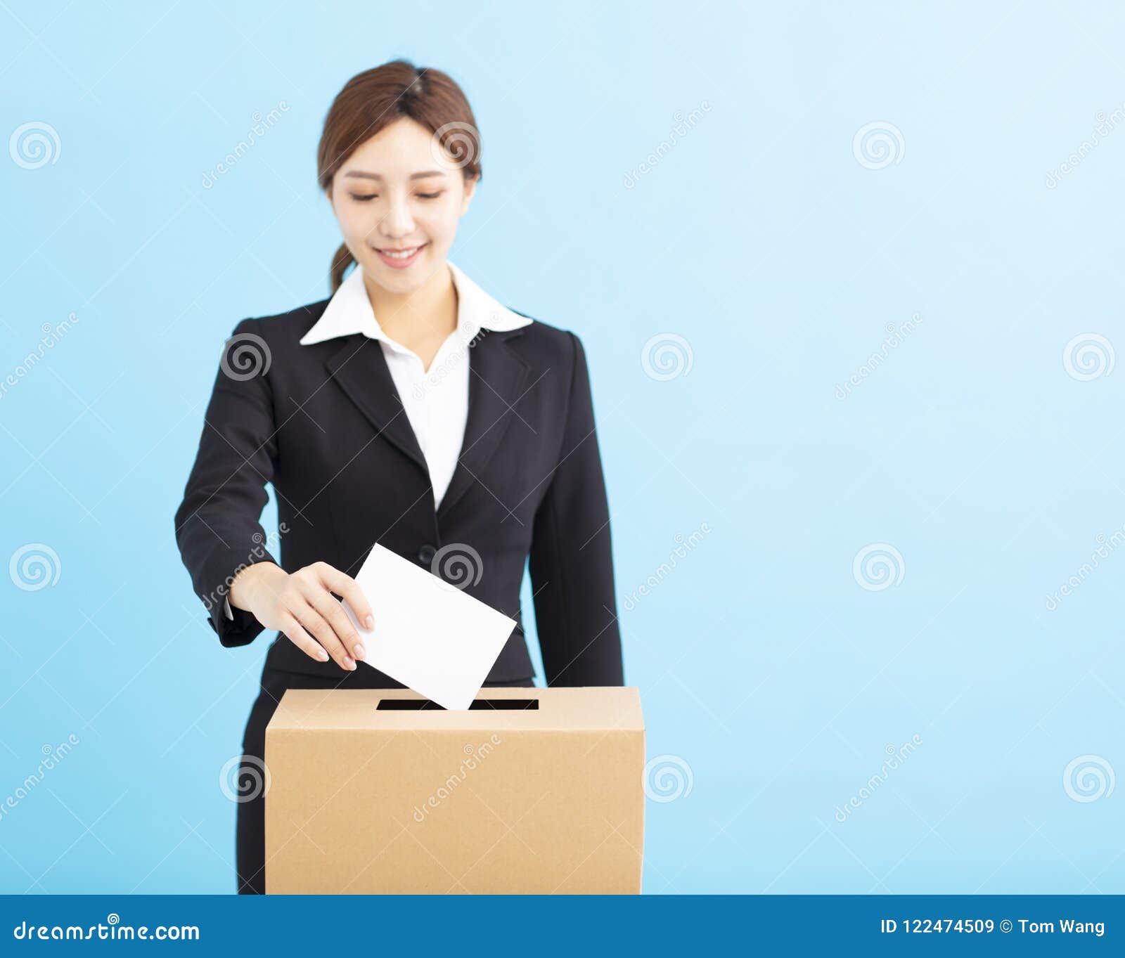 Woman Putting Ballot into Voting Box Stock Image - Image of person ...