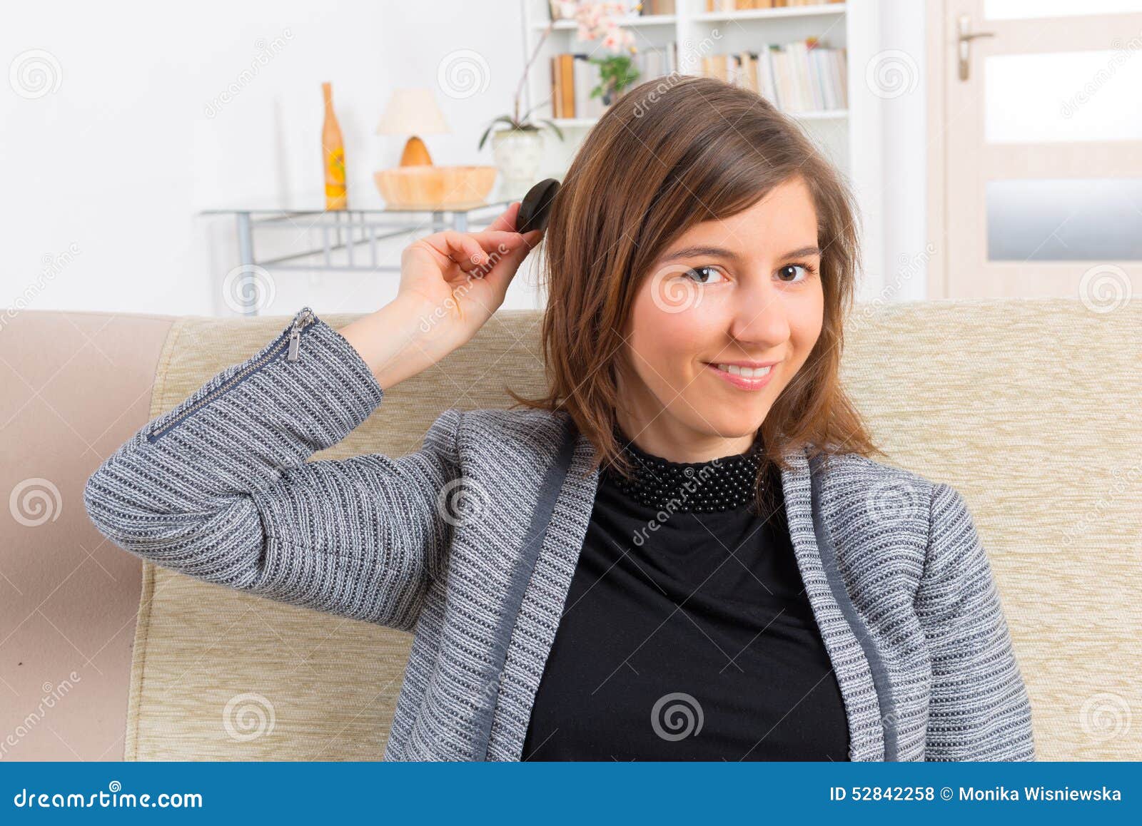 Woman Putting on Cochlear Implant Stock Photo - Image of instrument ...
