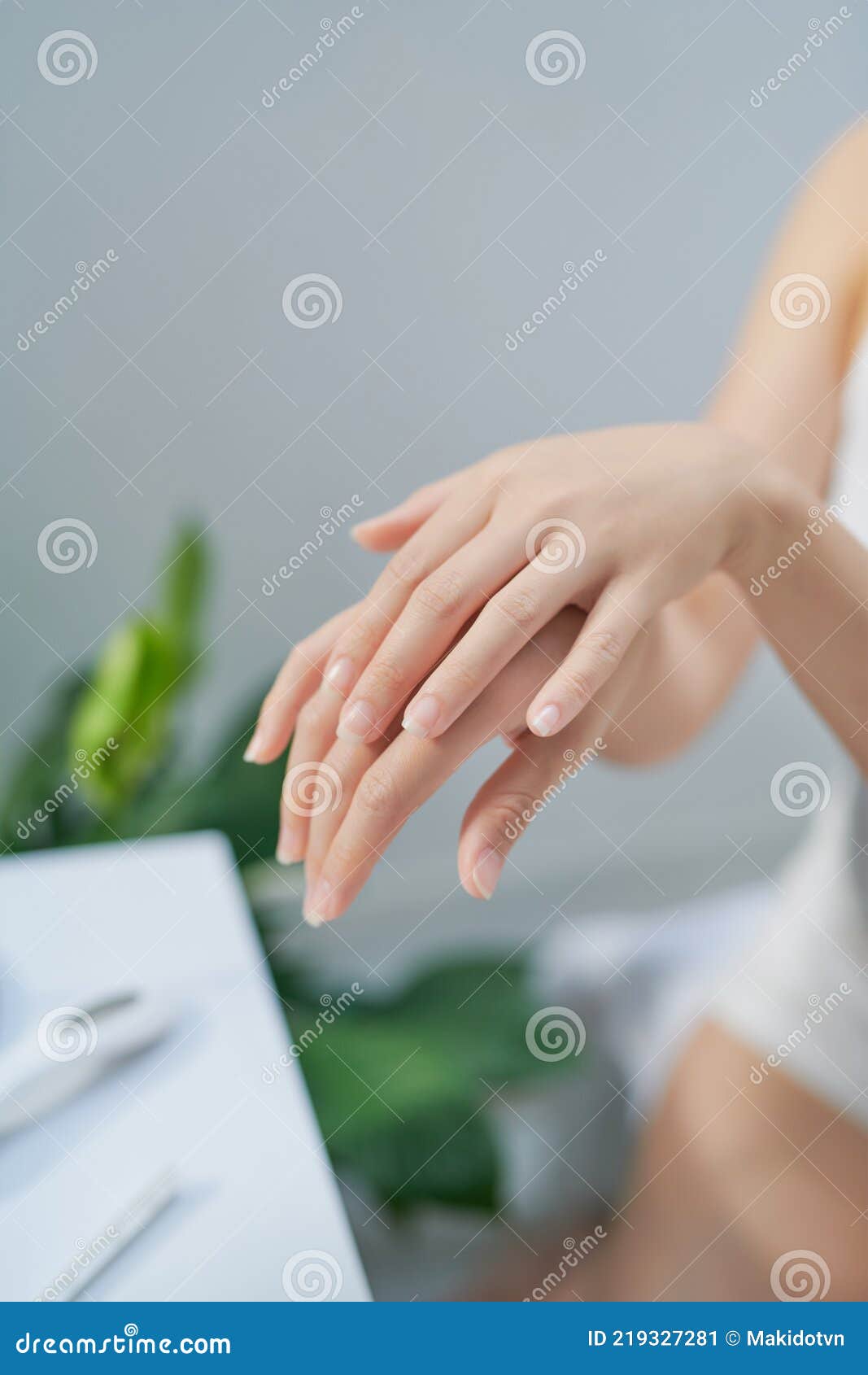 Woman Putting Cream on Hands Stock Image - Image of manicure ...