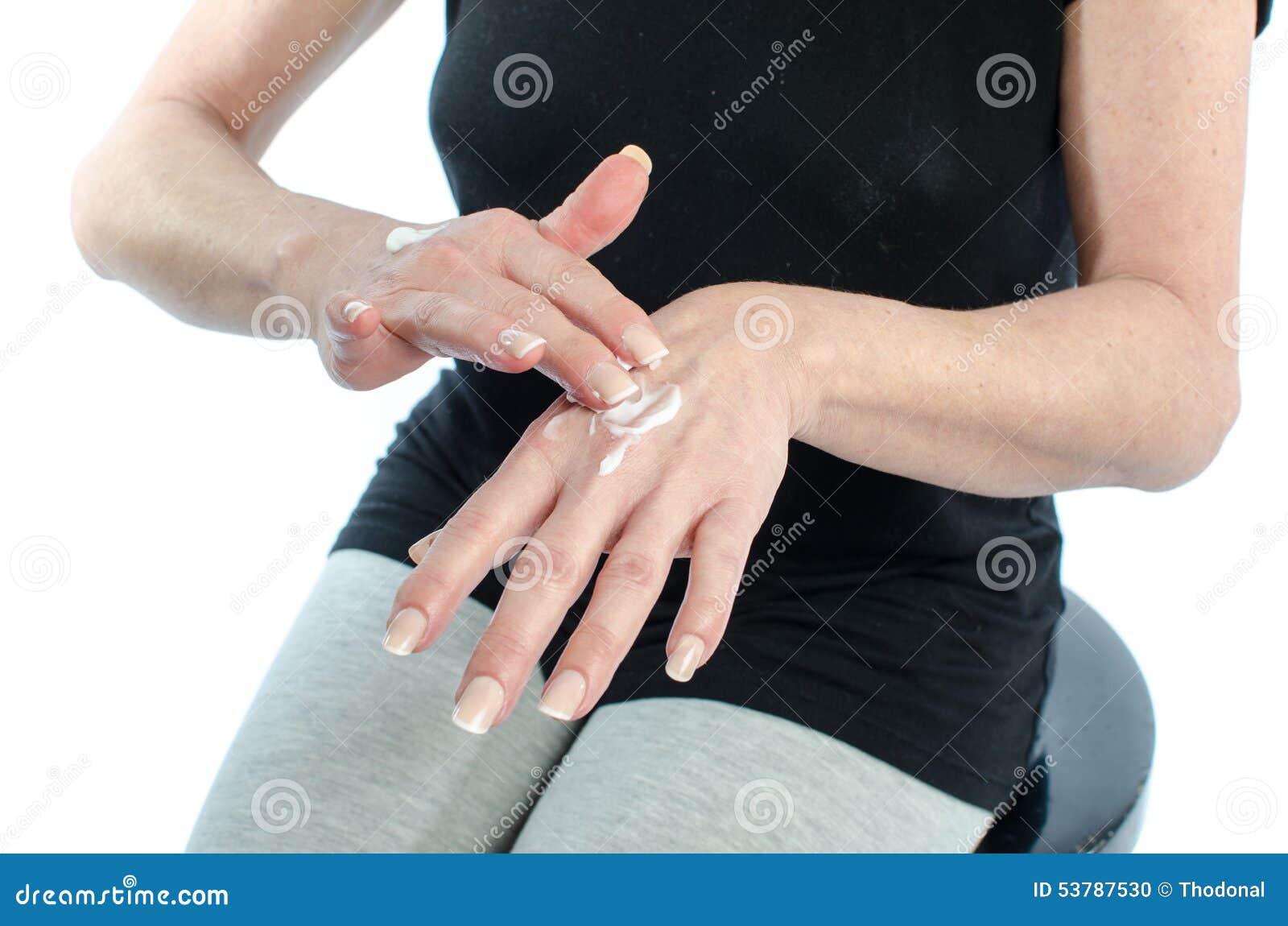 Woman Putting Cream on Her Hand Stock Photo - Image of creme, applying ...