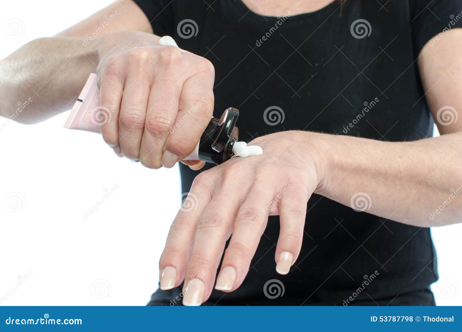 Woman Putting Cream on Her Hand Stock Photo - Image of lotion, manicure ...