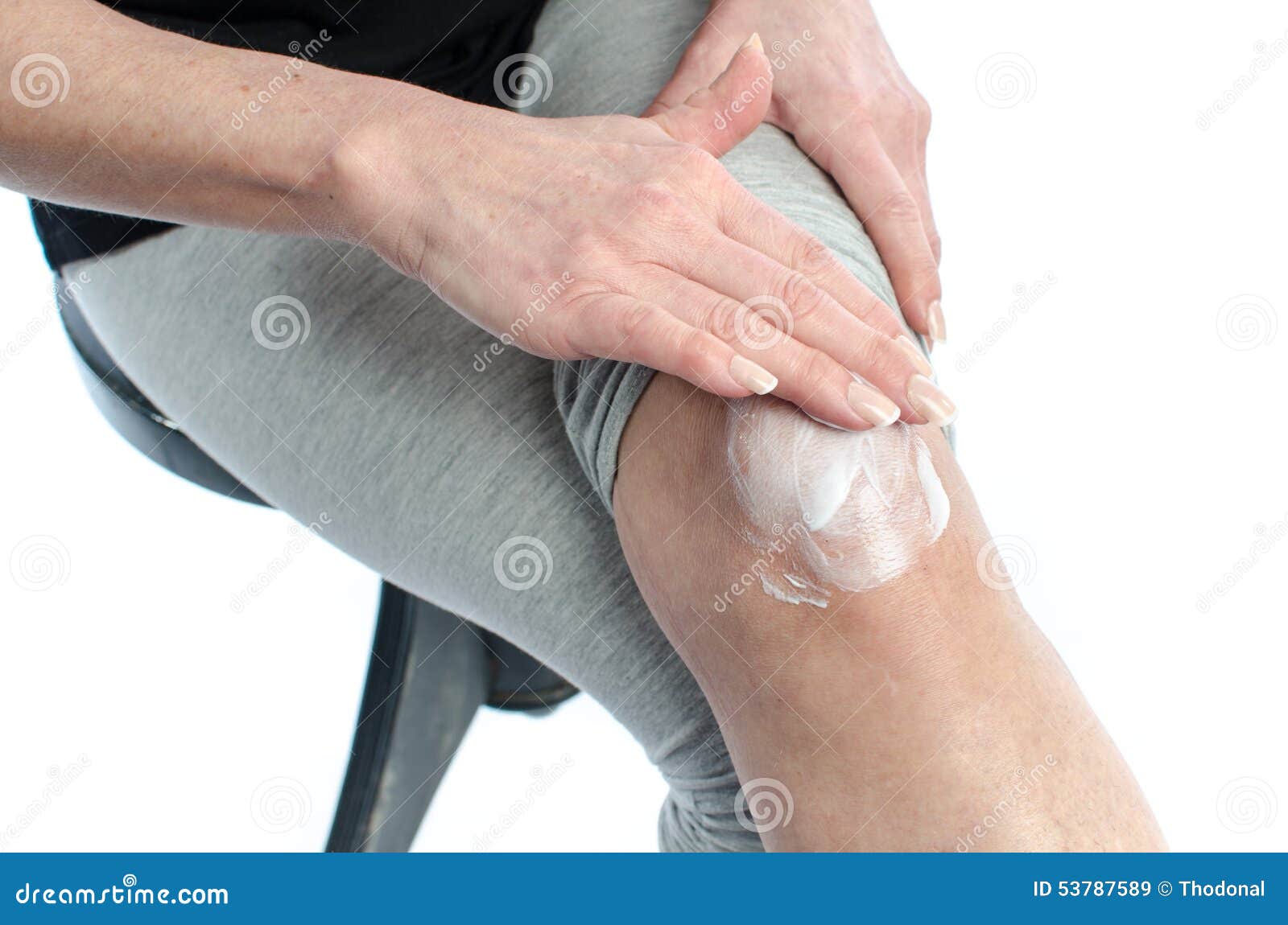 Woman Putting Cream on Her Knee Stock Image - Image of eczema, cosmetic ...