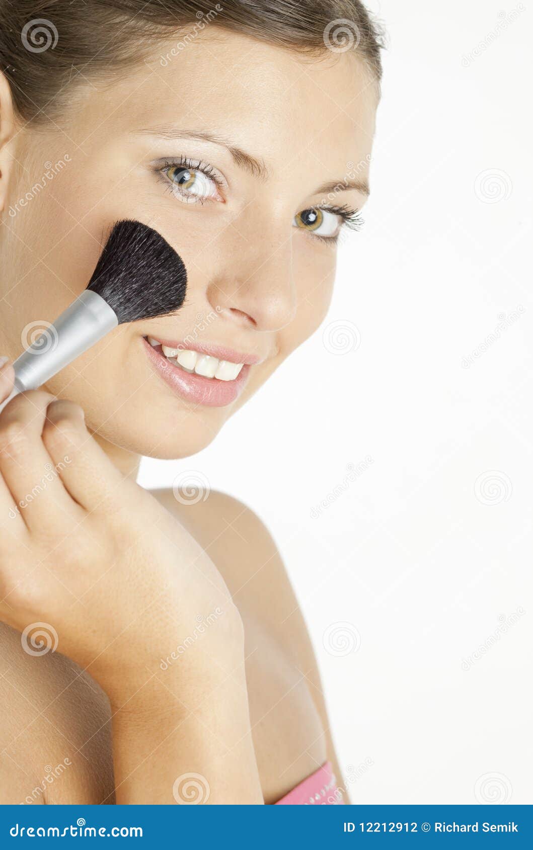 Woman Putting on Face Powder Stock Photo - Image of inside, brunettes ...