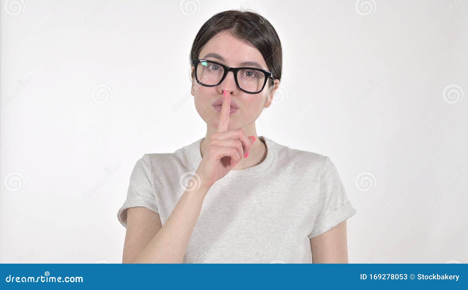 The Woman Putting Finger on Lips on White Background Stock Image ...