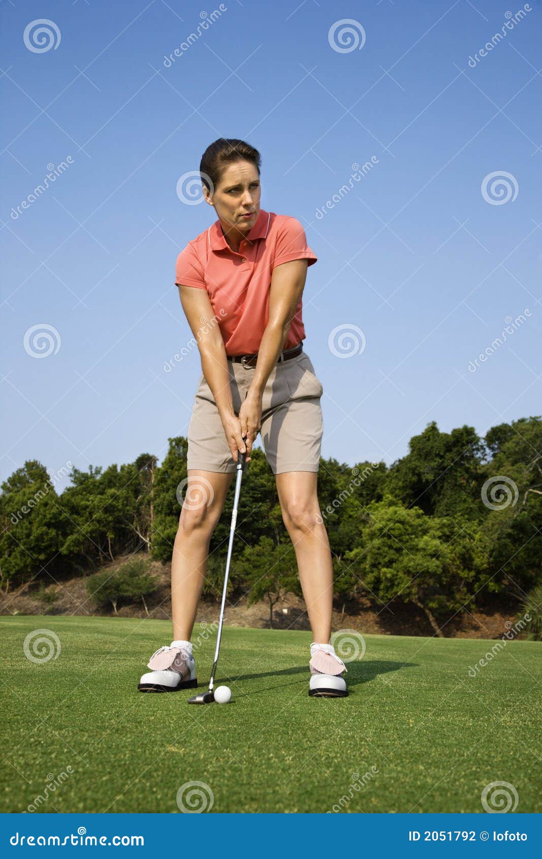 Woman putting golf ball. stock photo. Image of outdoors - 2051792