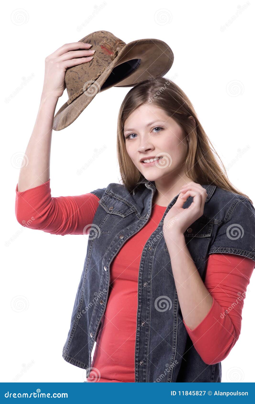 Woman putting on hat stock image. Image of cowboy, lifestyle - 11845827