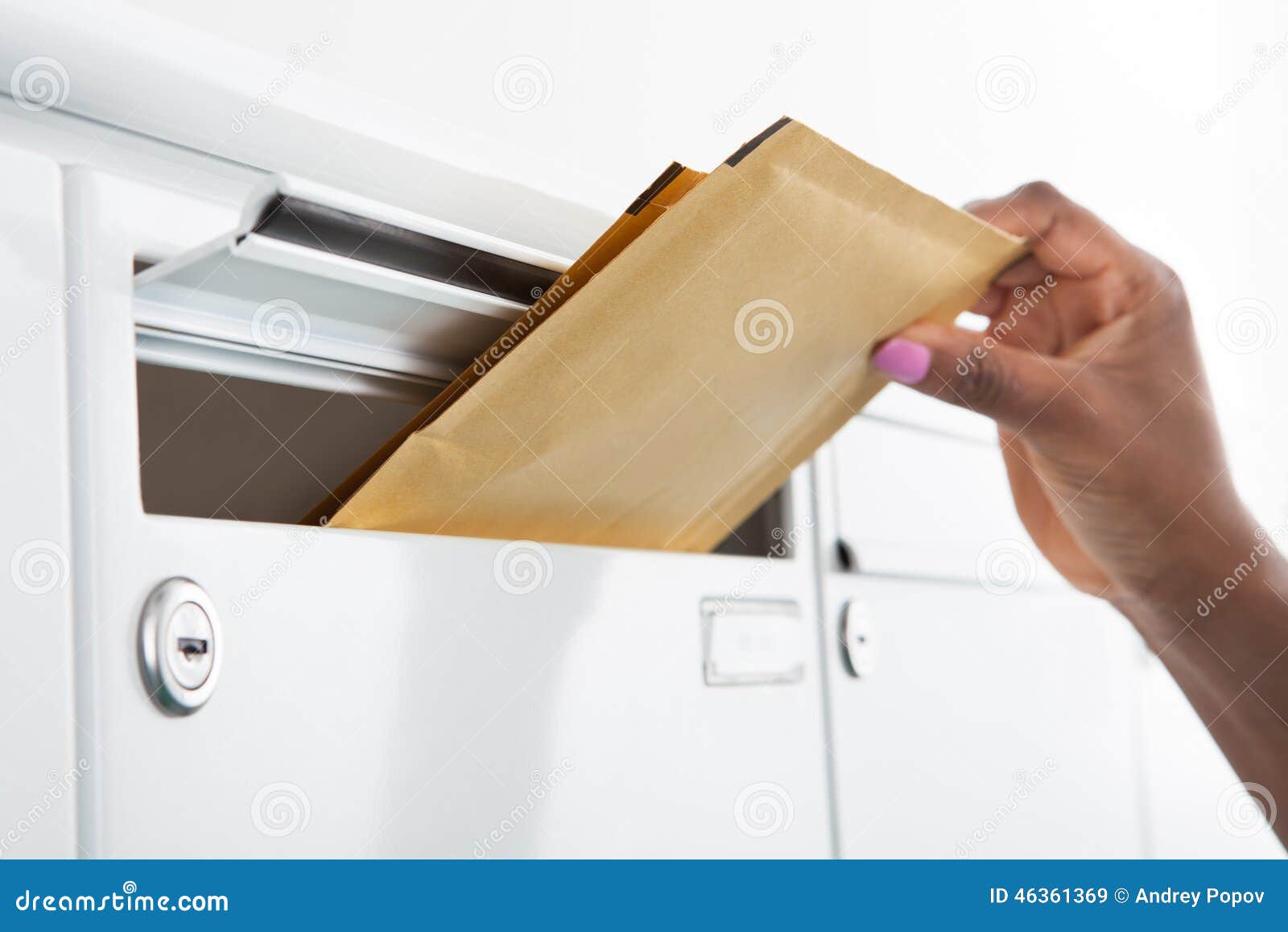 Woman Putting Letters in Mailbox Stock Image - Image of holding ...
